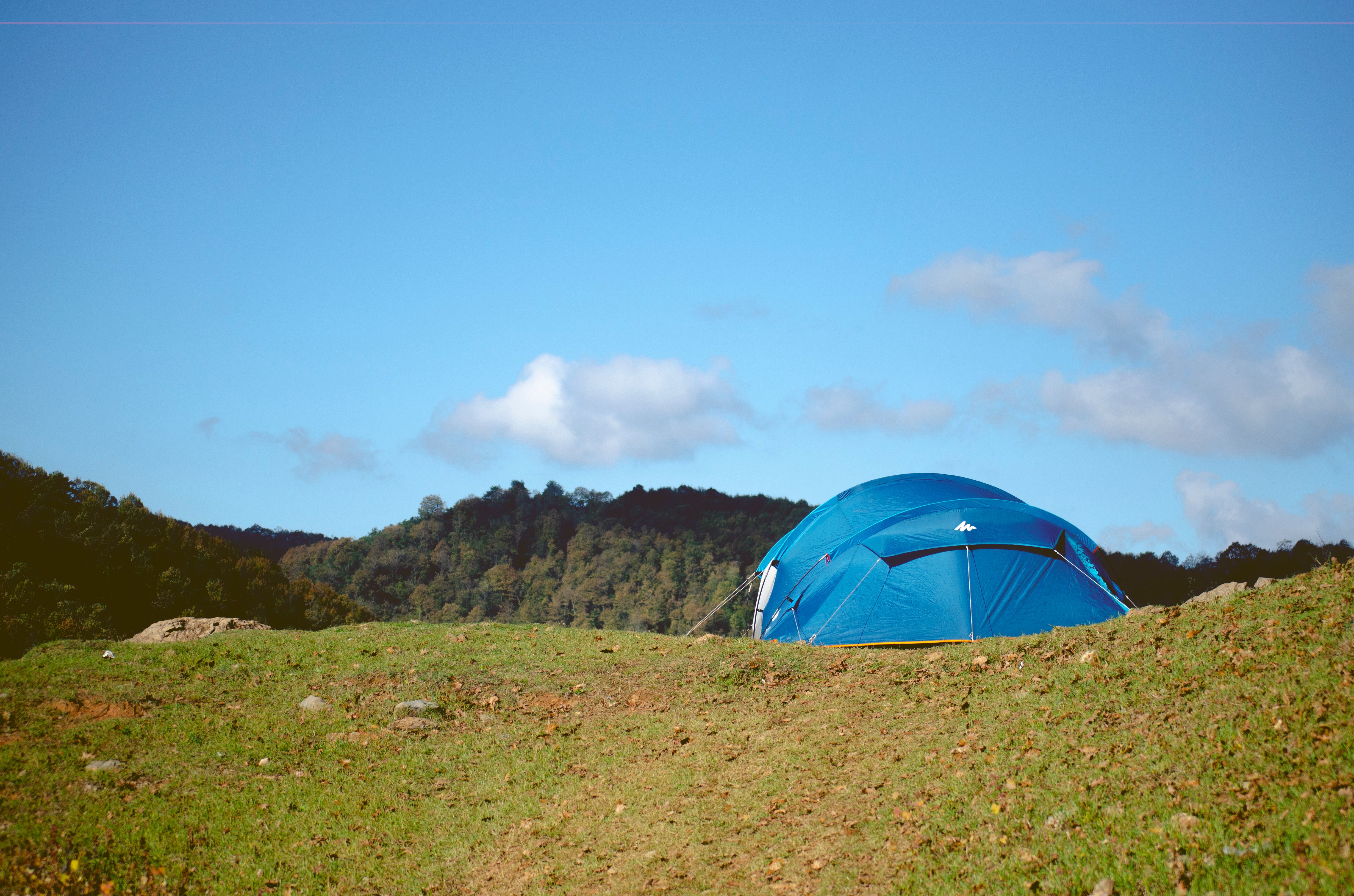 Blue Tent on the Grass Field · Free Stock Photo