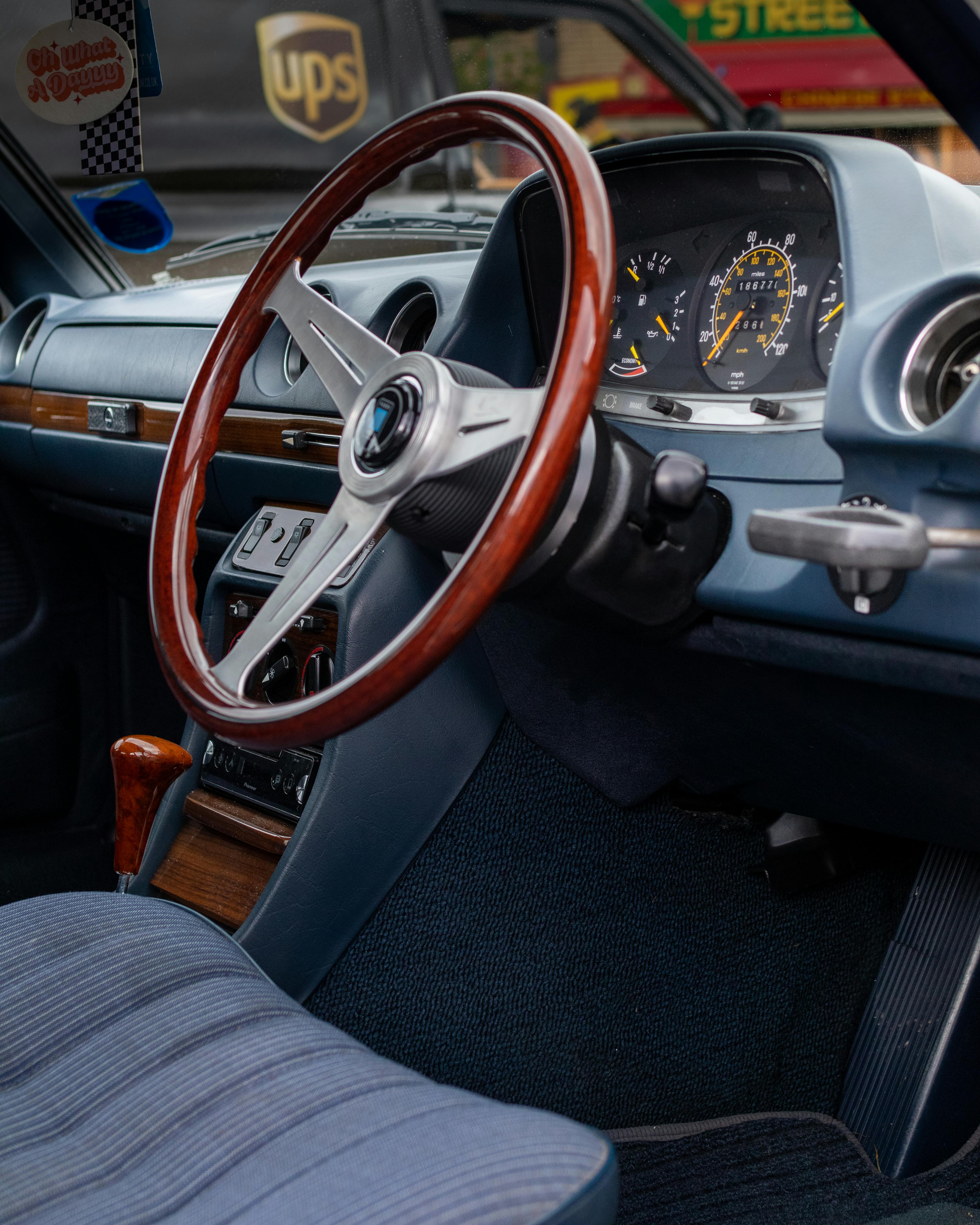 A Brown Steering Wheel Inside the Car · Free Stock Photo