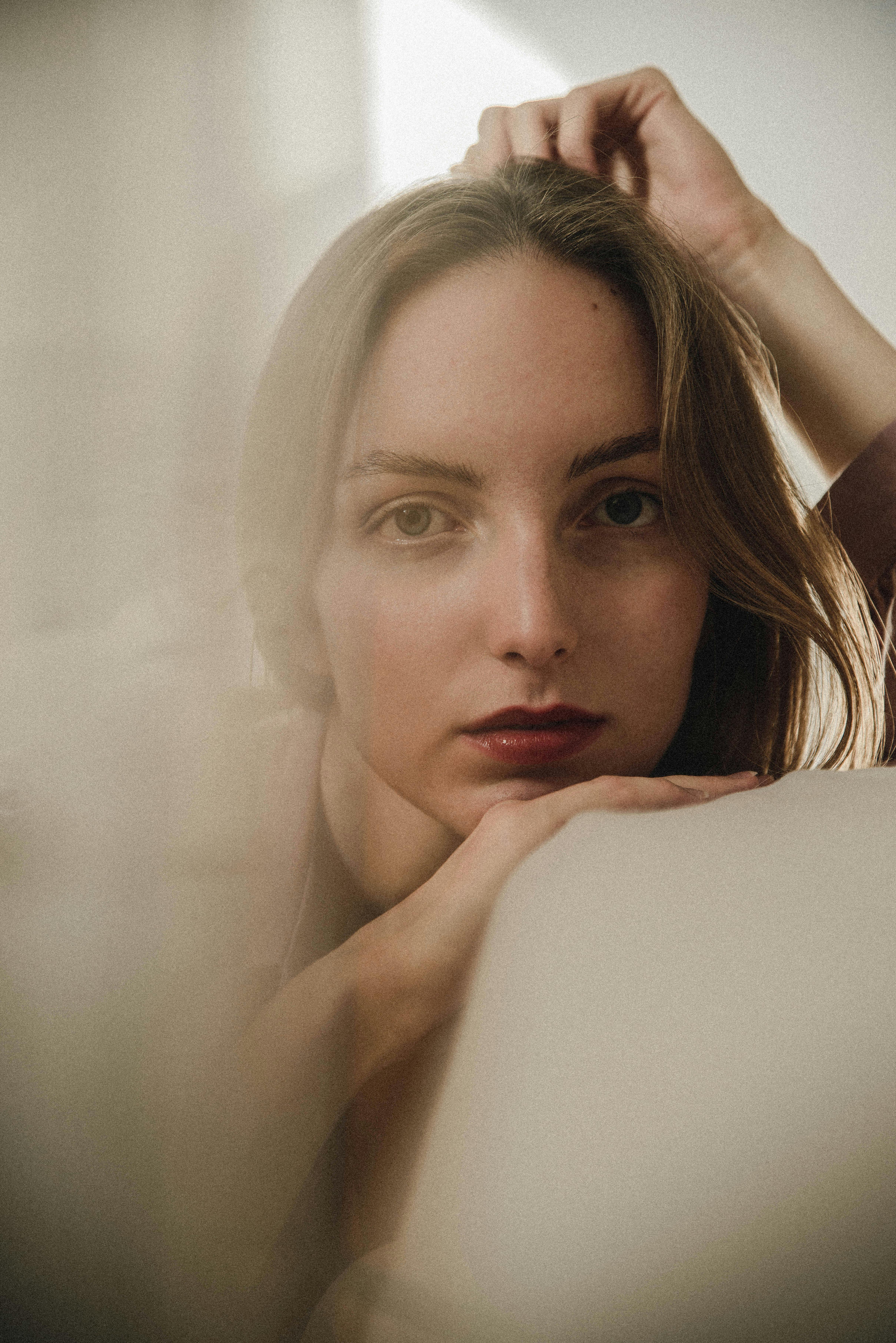 A Woman Looking at the Camera · Free Stock Photo