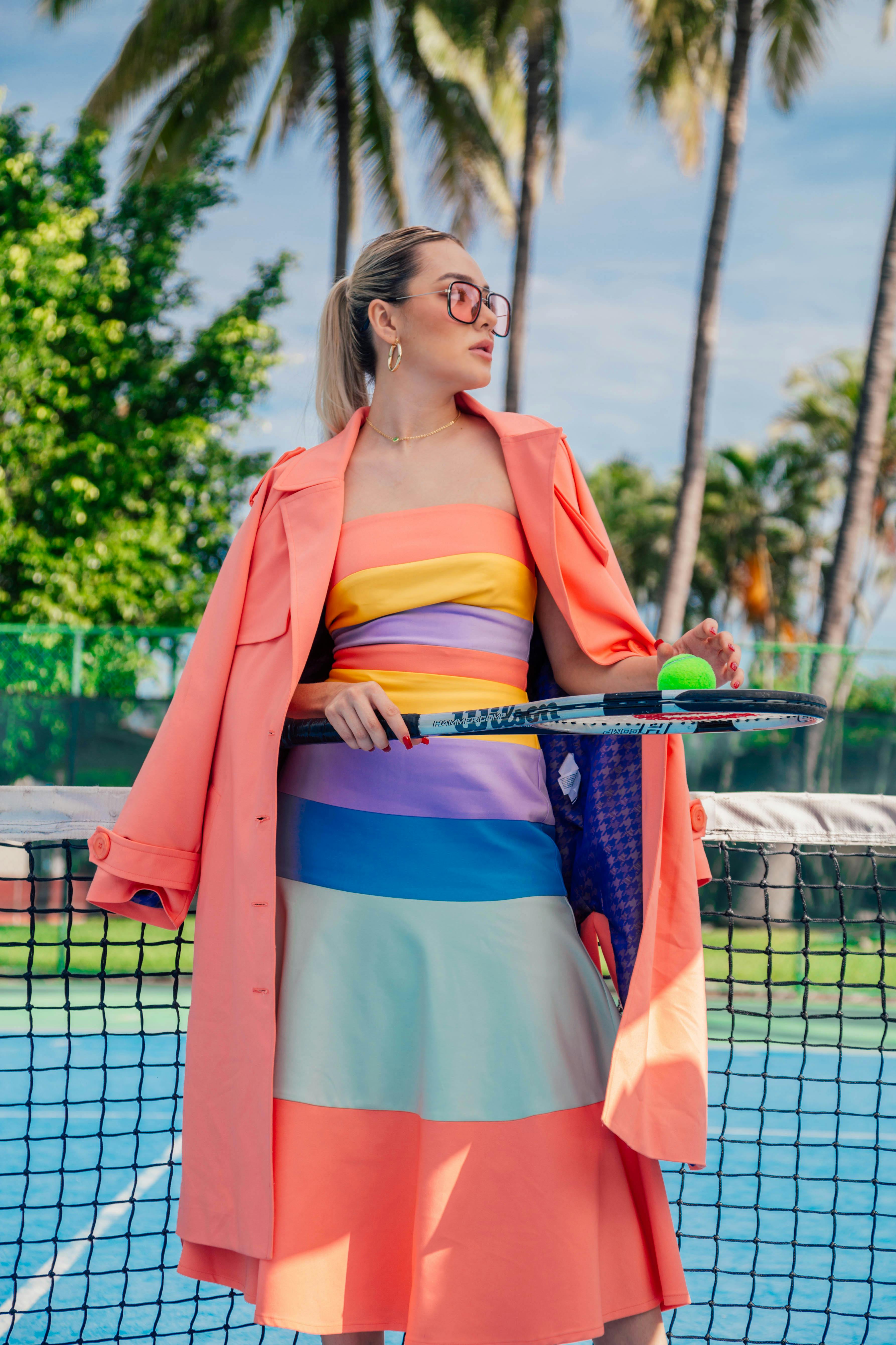 A Low Angle View of Fashion Model Standing on Tennis Court · Free Stock ...