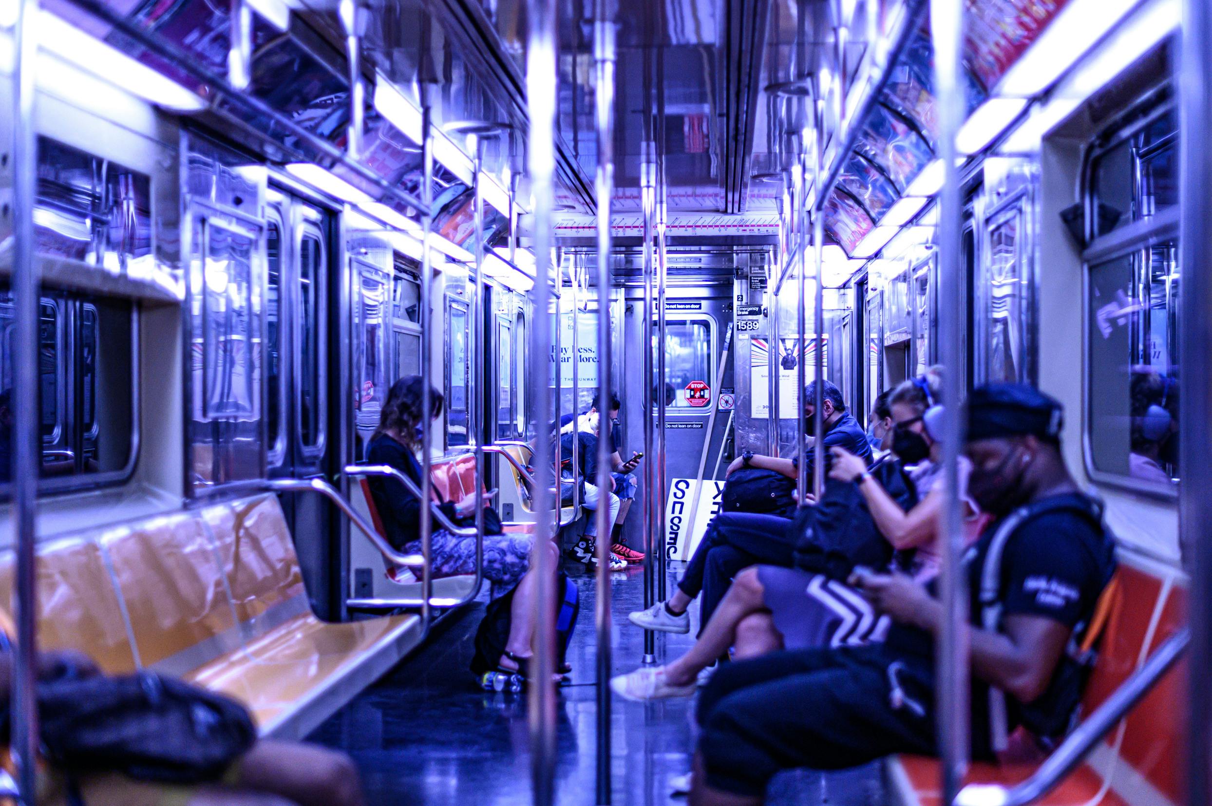 People Sitting on Train Seat · Free Stock Photo