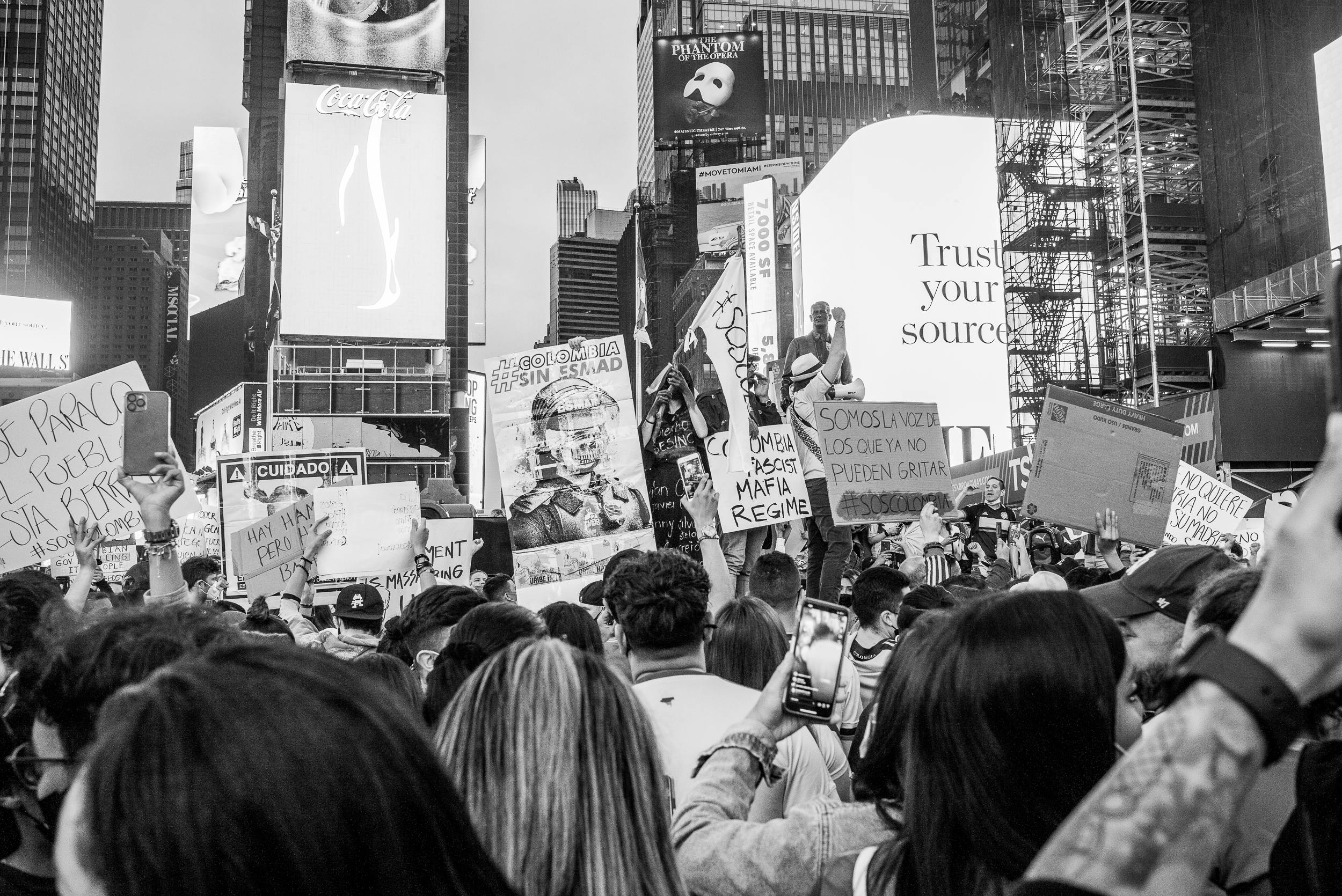 A Grayscale of People Protesting Together · Free Stock Photo
