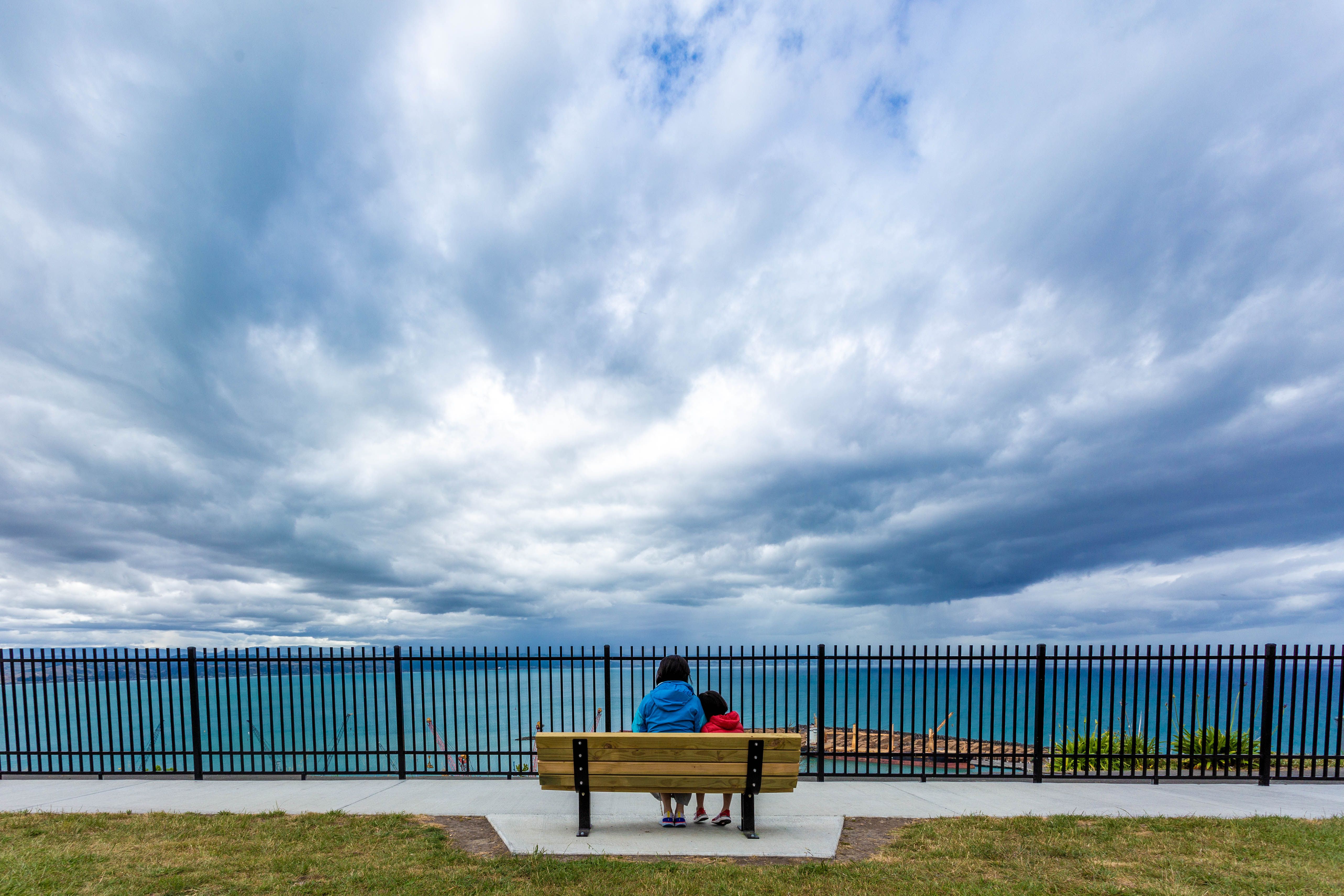 People Sitting on Bench · Free Stock Photo