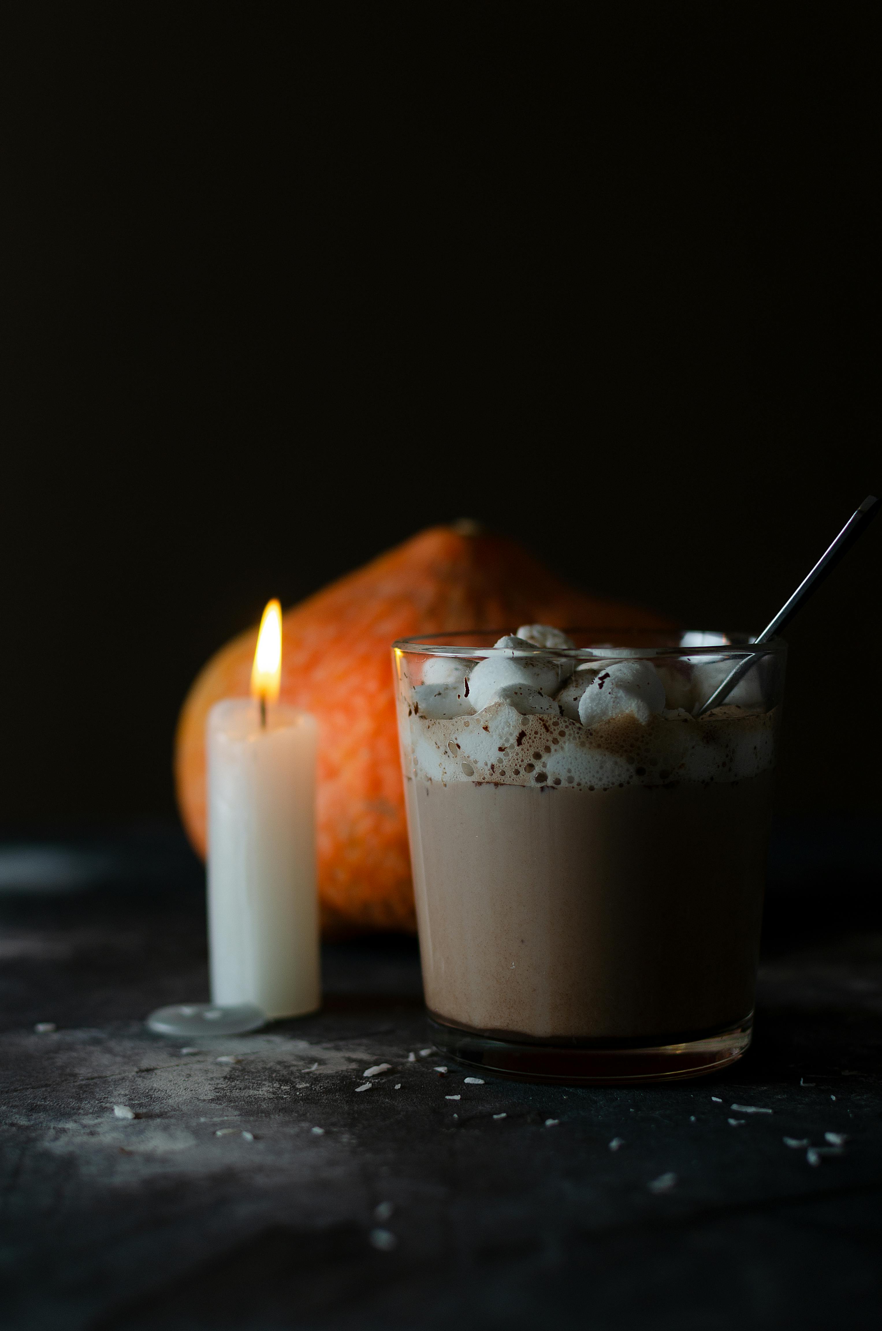 Candle Beside a Drink · Free Stock Photo