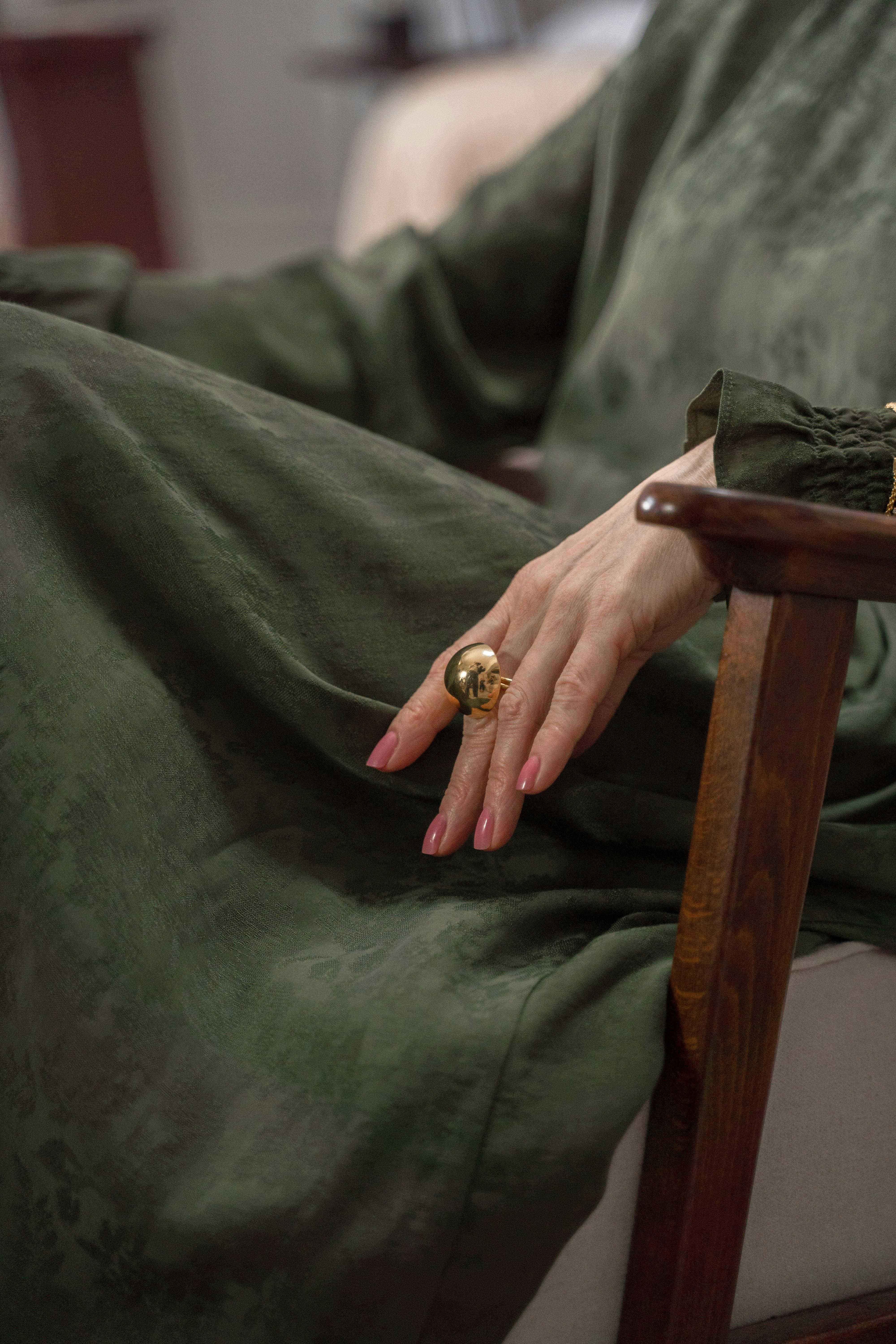 Elderly Woman Sitting and the Ring on her Hand · Free Stock Photo