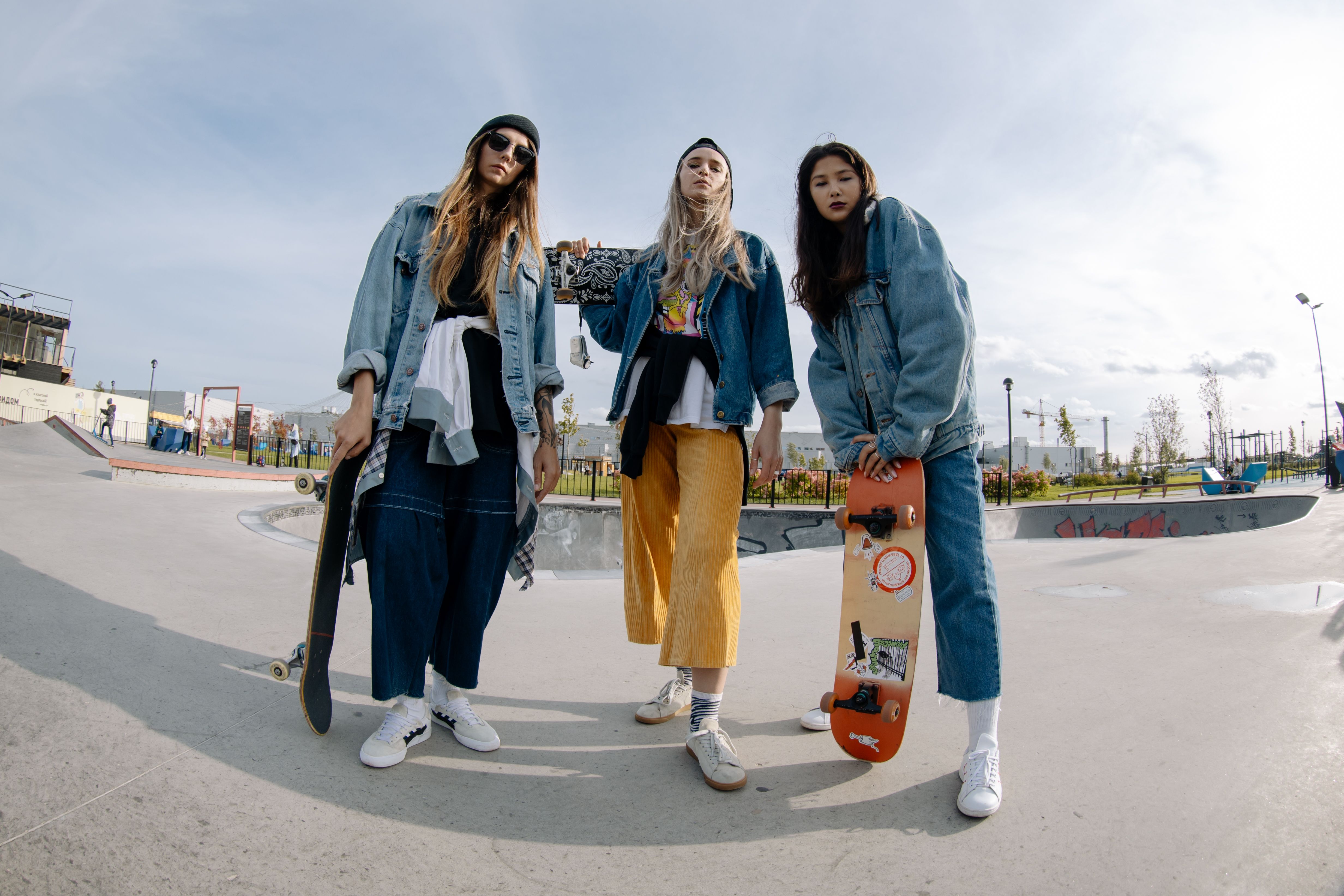 Group of Teenage Girls Wearing Jackets Posing and Standing on Skate ...