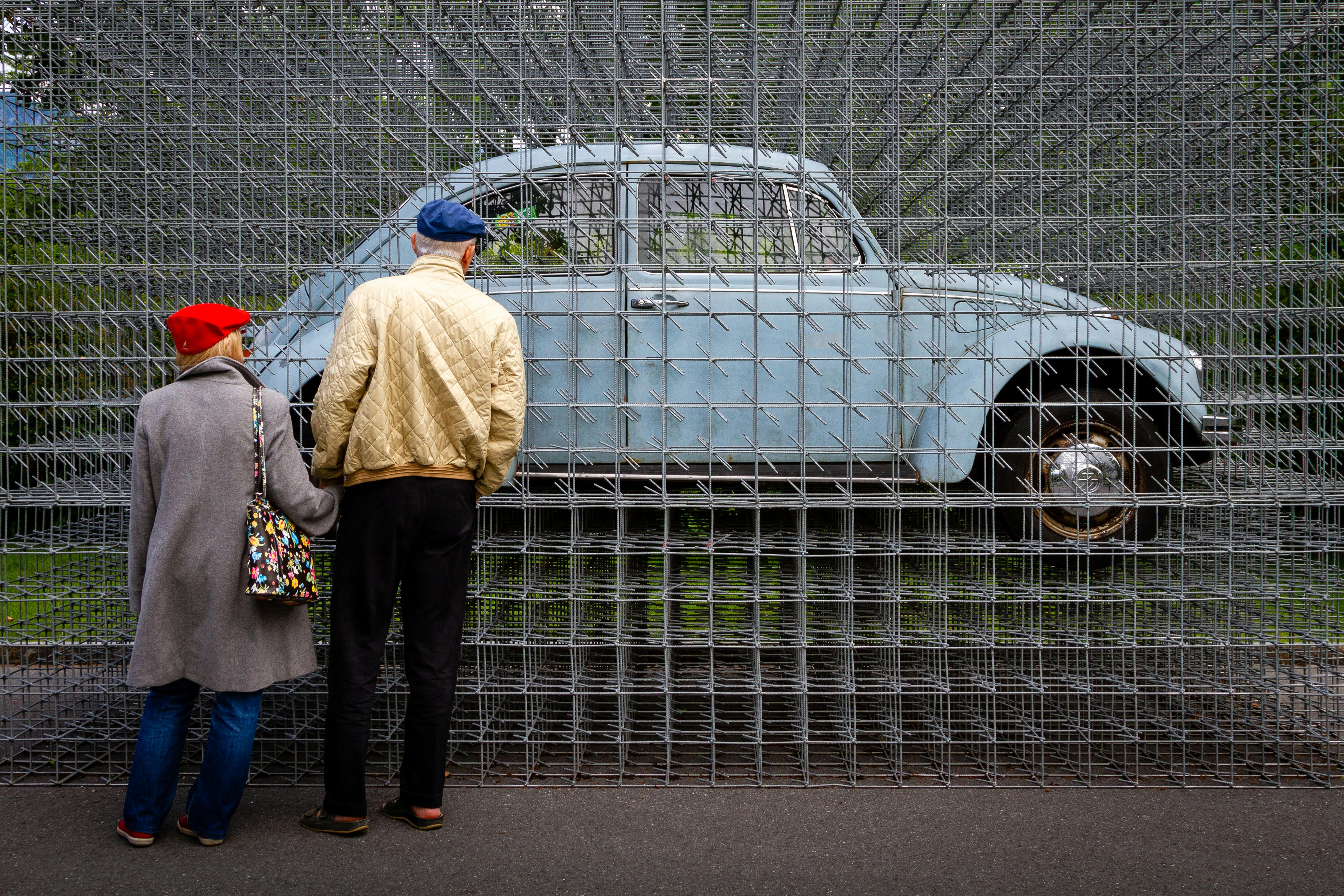 Elderly Couple Watching Classic Car · Free Stock Photo