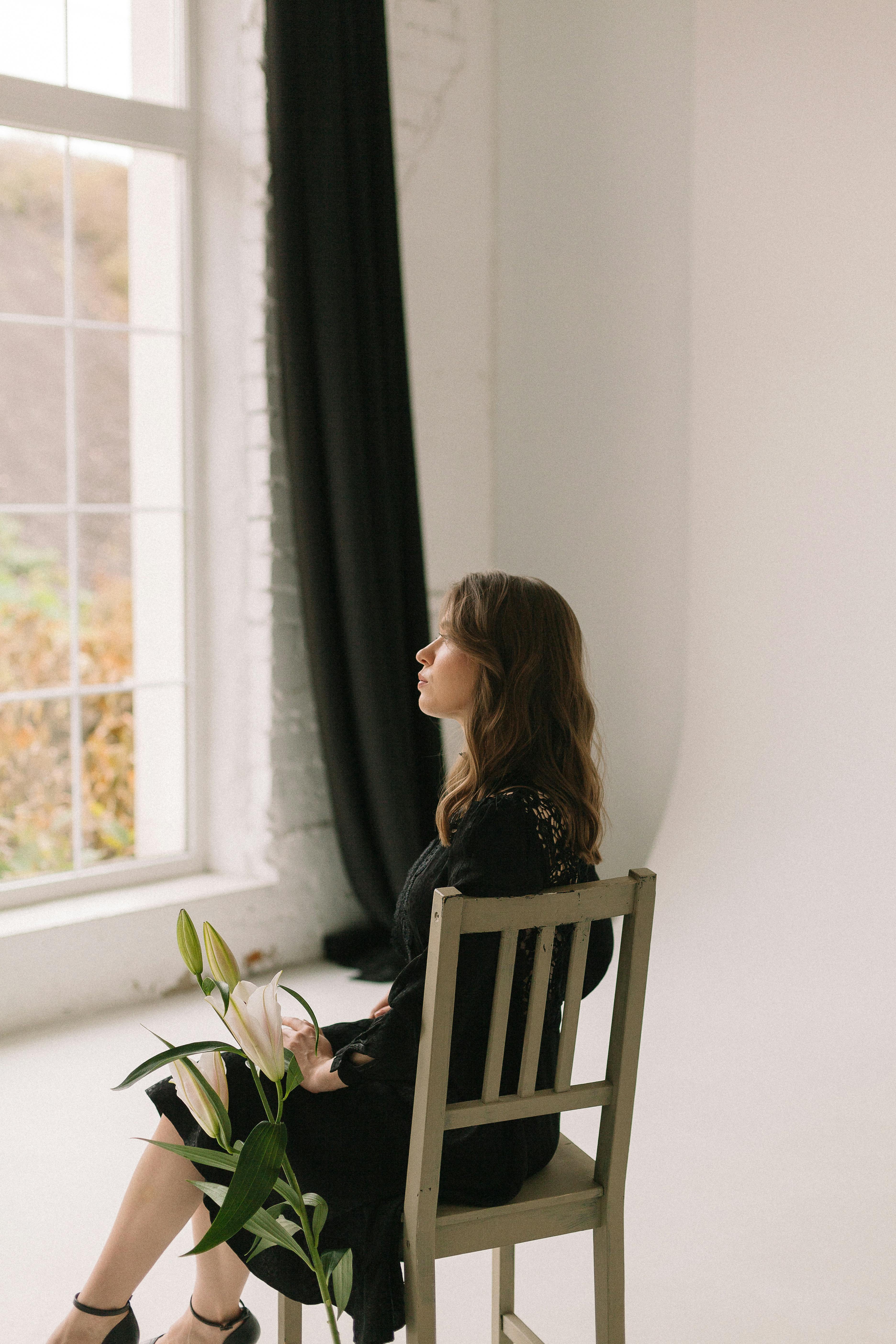 Woman Looking through Window · Free Stock Photo