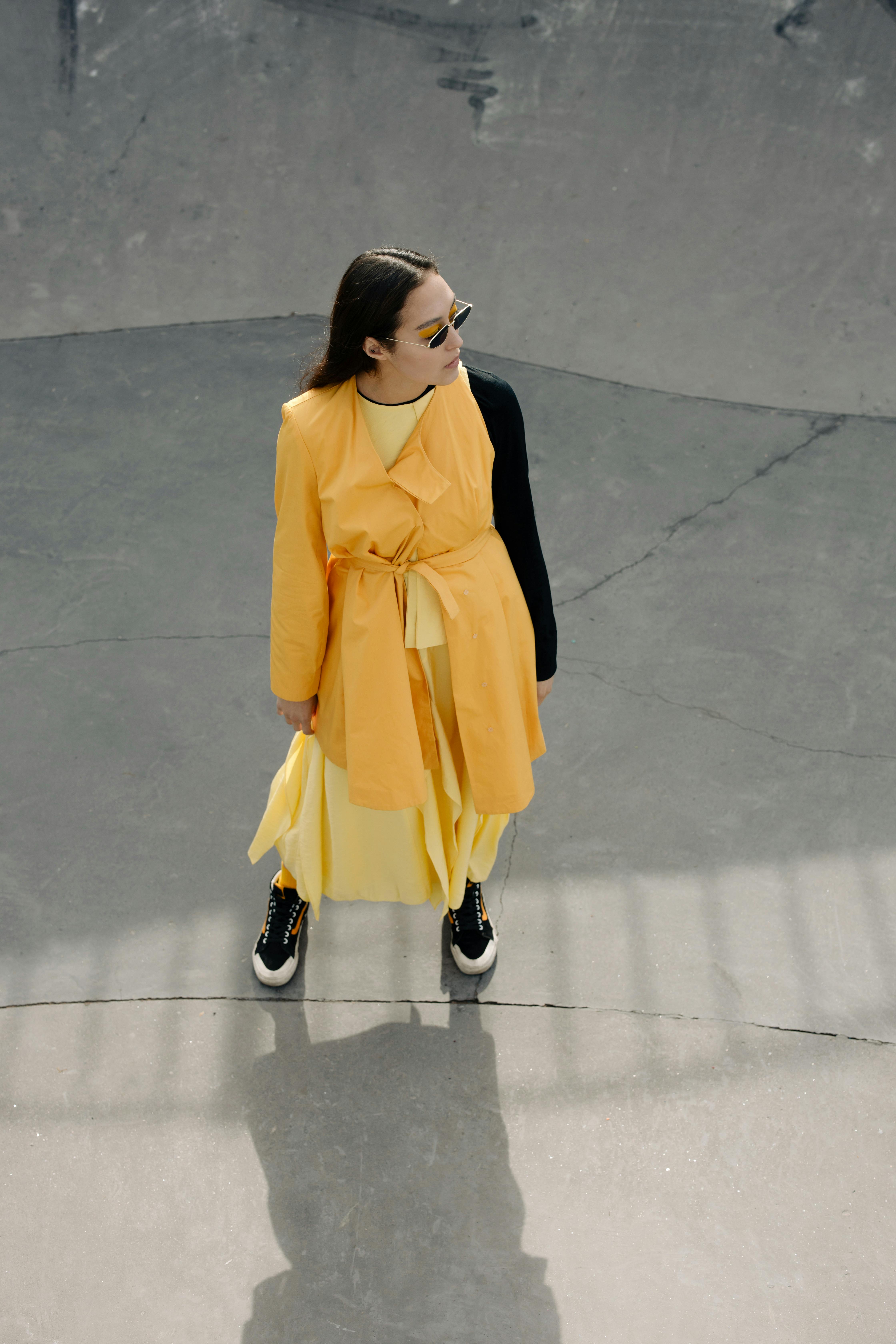 Woman in Yellow Clothes · Free Stock Photo