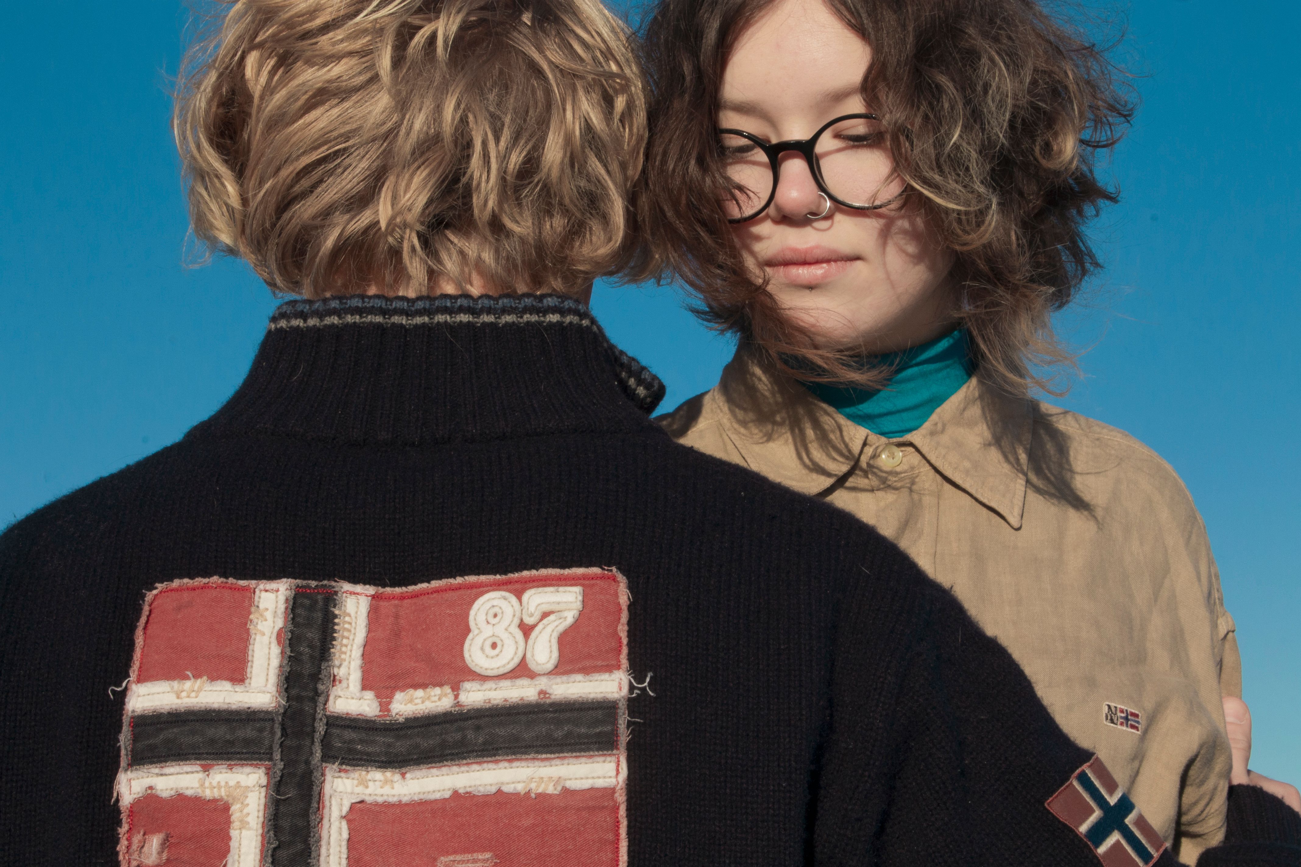 Young Man and Woman Standing Face to Face · Free Stock Photo