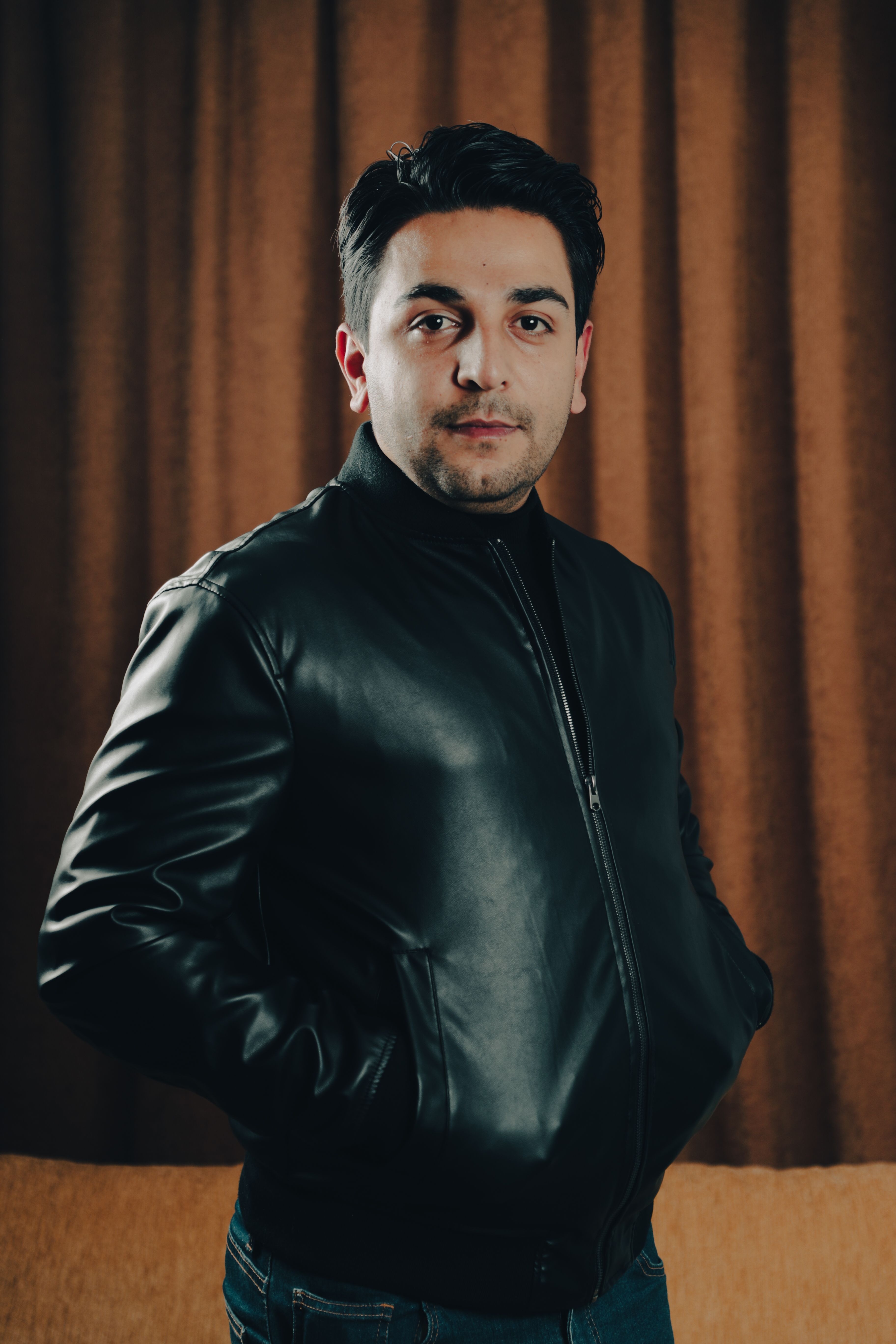 Portrait of Man in Jacket with Hand in Pocket · Free Stock Photo