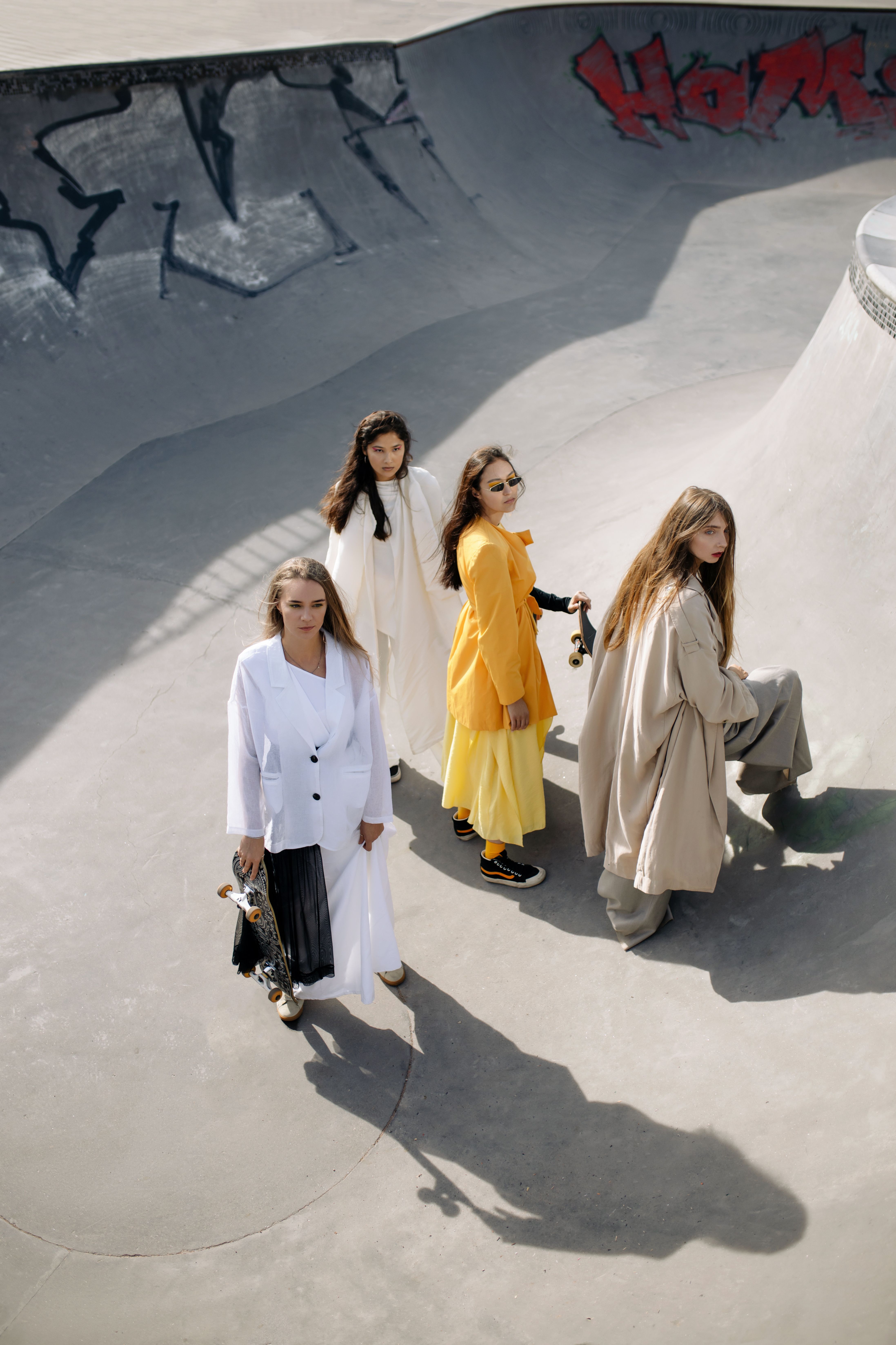 Group of Teenage Girls Wearing Jackets Posing and Standing on Skate ...