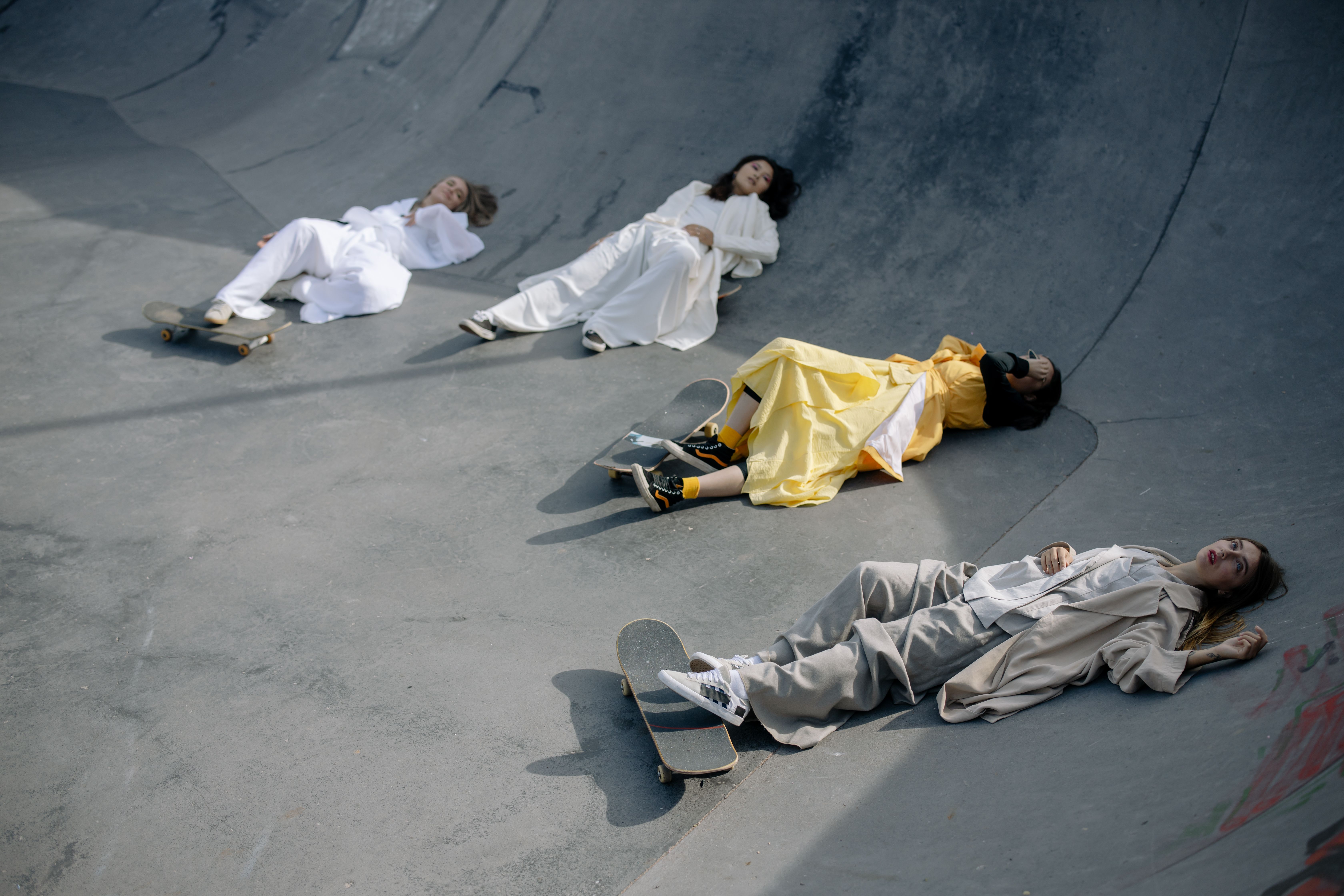 Women Lying on a Skate Ramp · Free Stock Photo