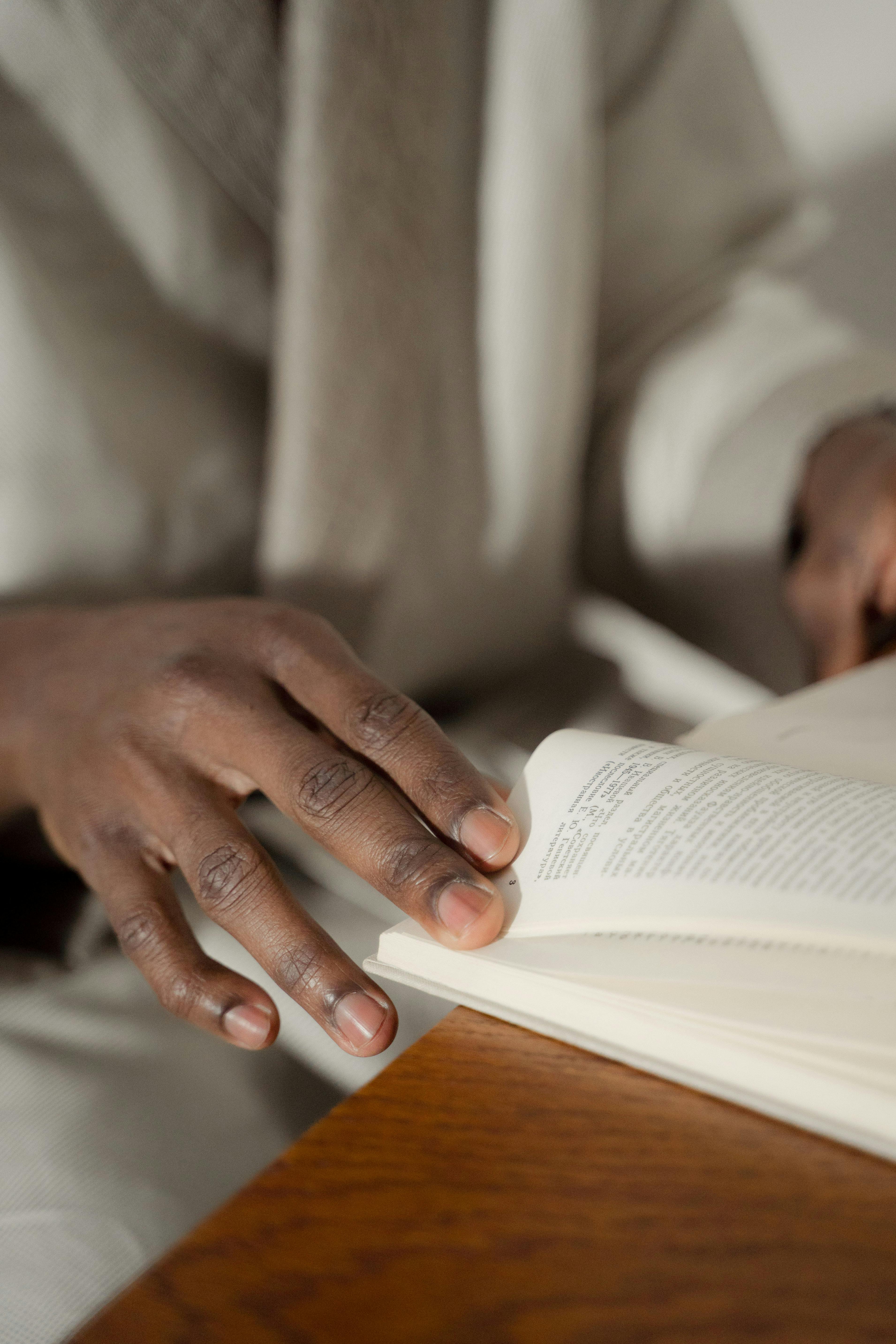 Man Hands Holding Book · Free Stock Photo