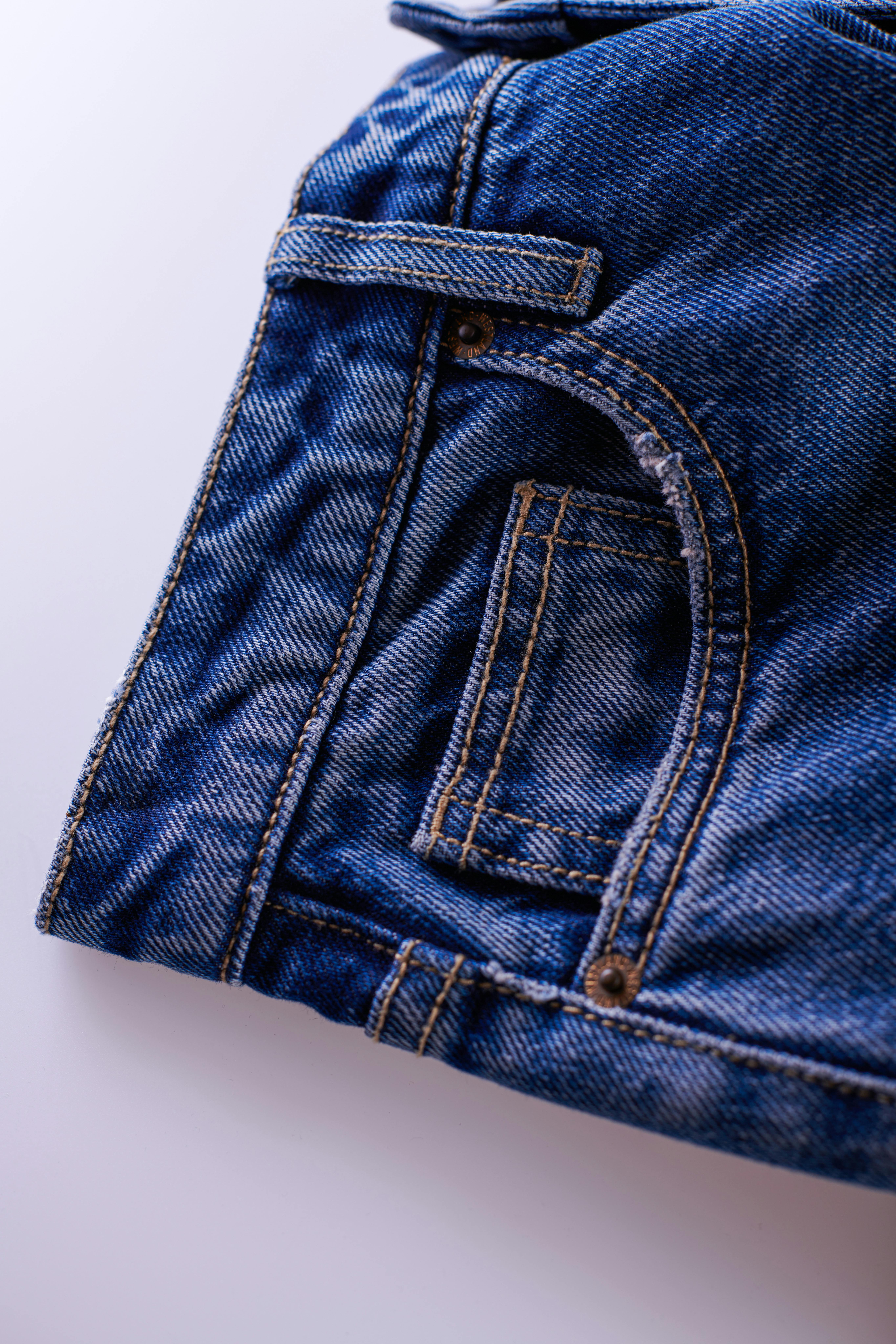 Close-Up Photograph of a Denim Jean's Zipper · Free Stock Photo