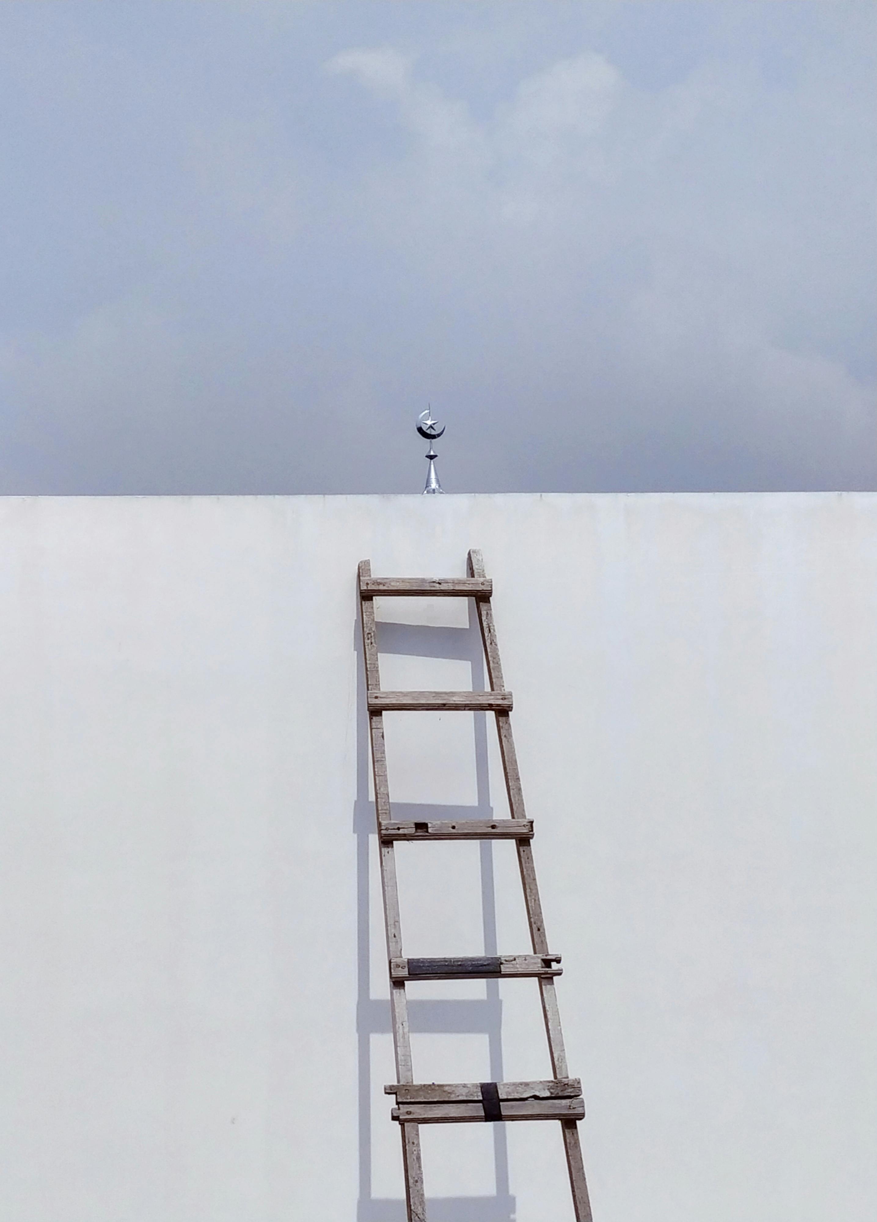 Scarves Wrapped Around Steps of Wooden Ladder · Free Stock Photo