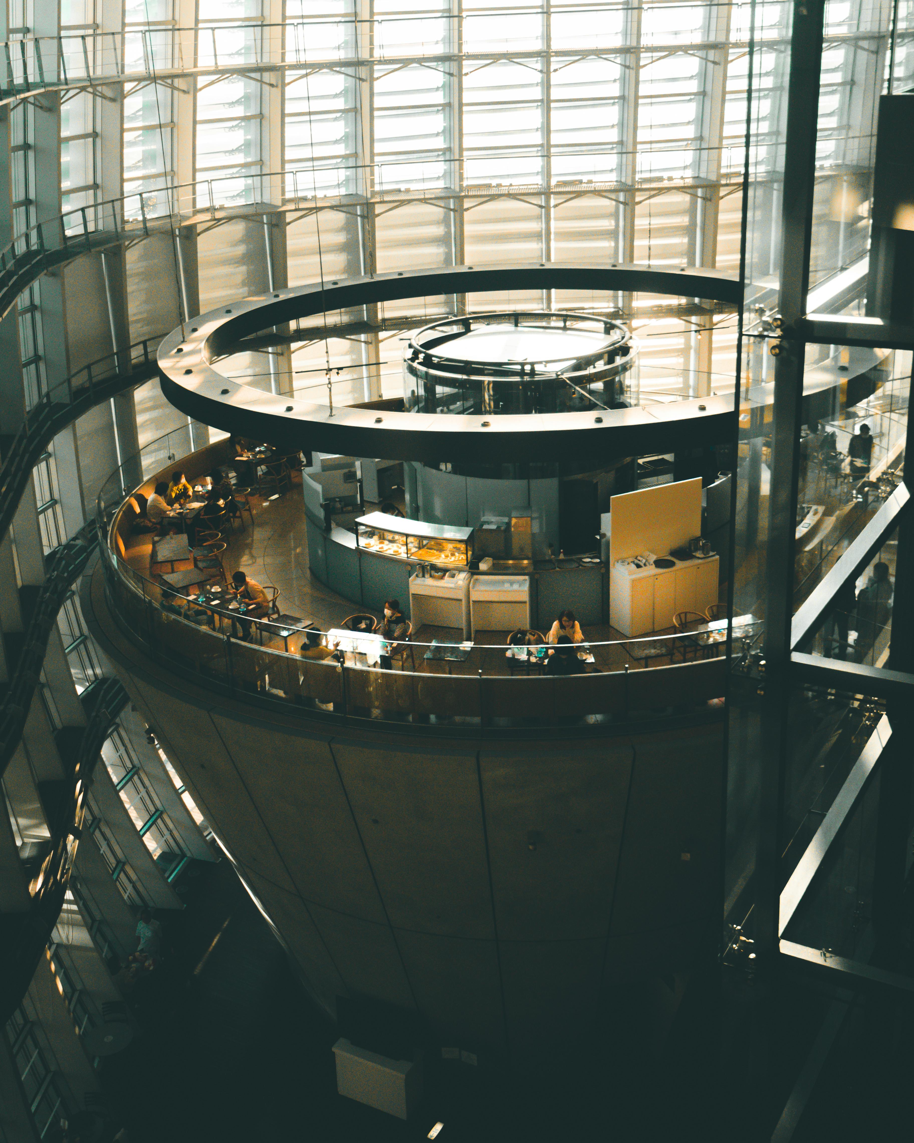 A Circular Shape Cafeteria inside a Building · Free Stock Photo