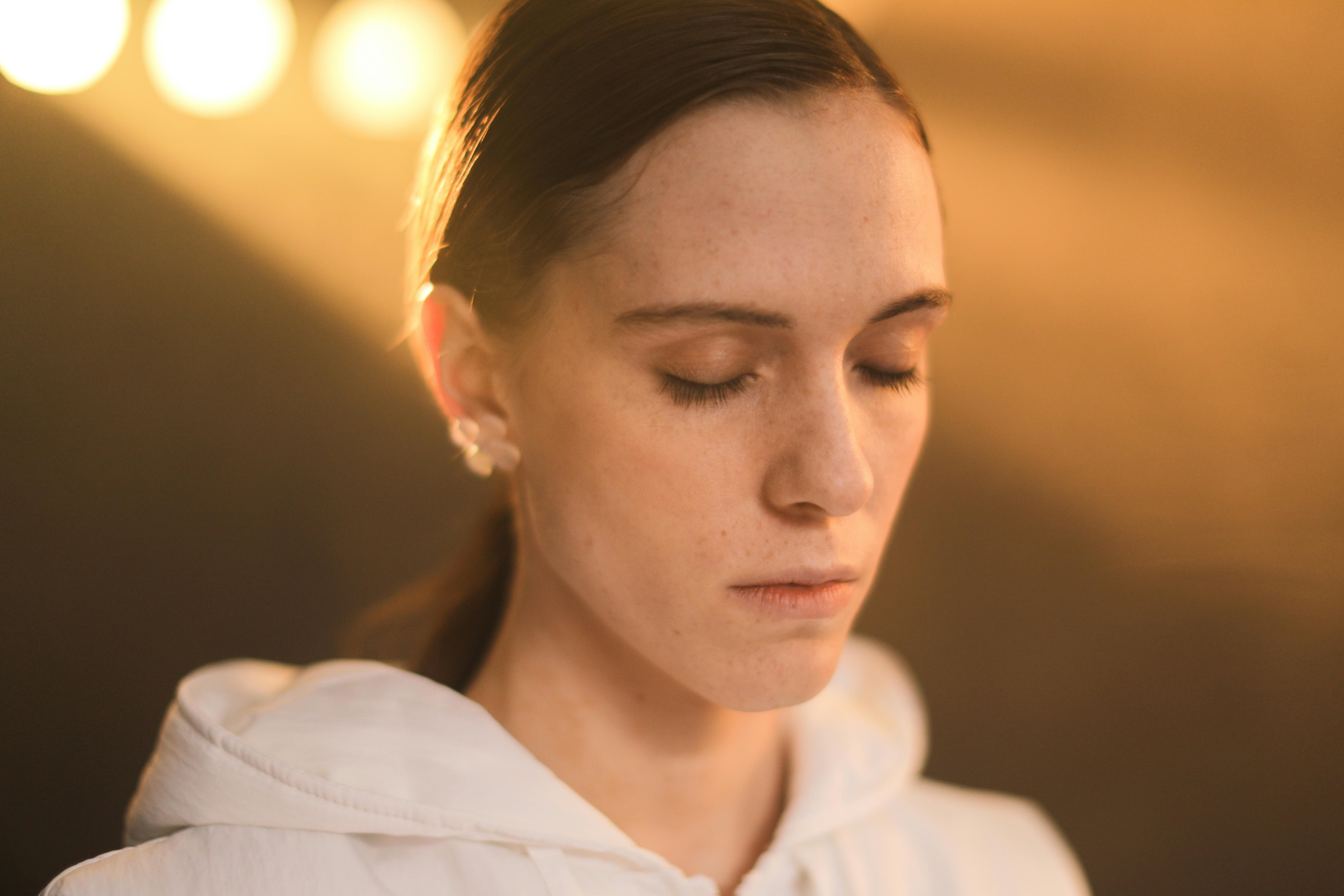 Woman Sleeping with Shadow and Sun Rays Falling on her · Free Stock Photo