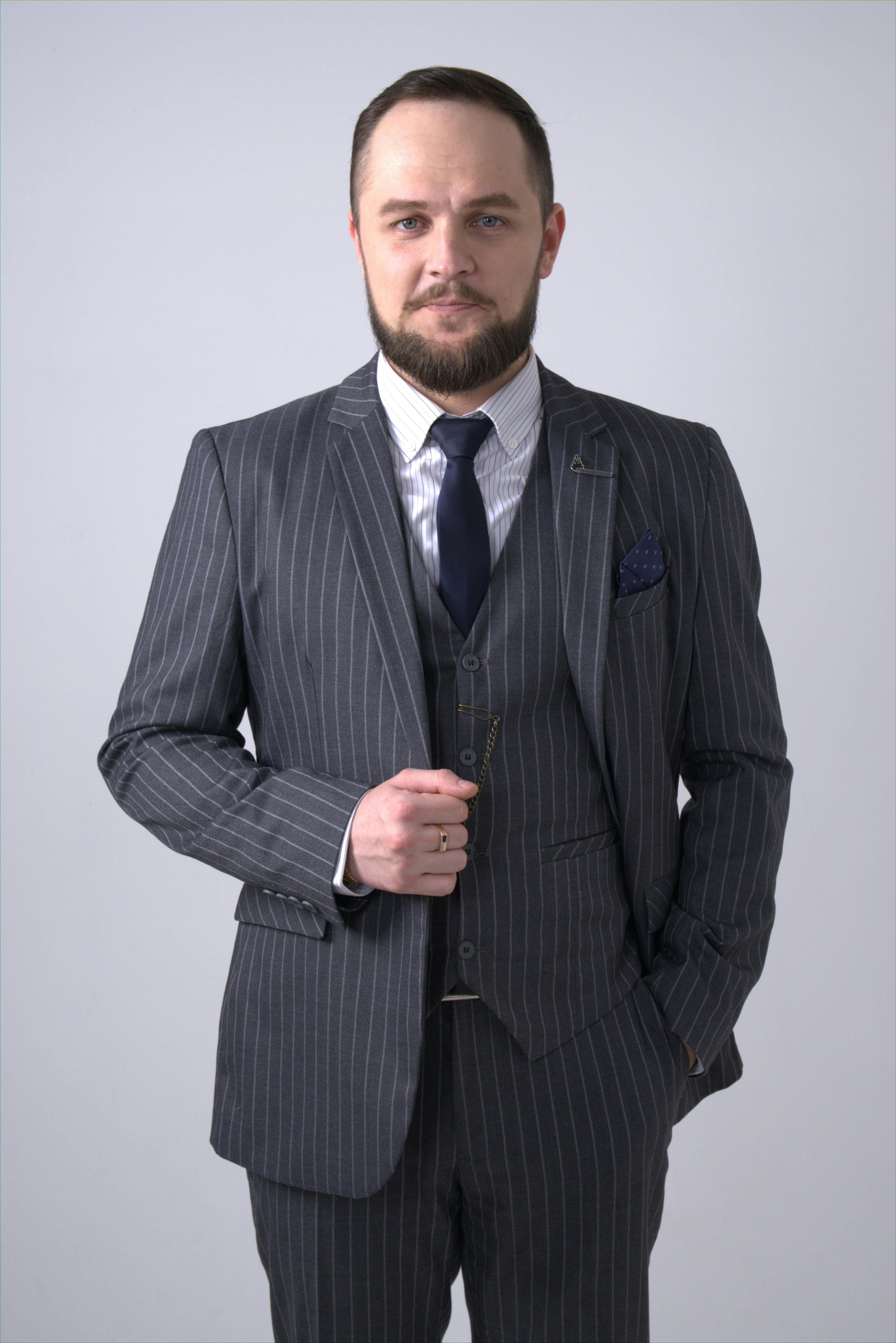 Studio Shoot of Wealthy Men in Black Suits · Free Stock Photo