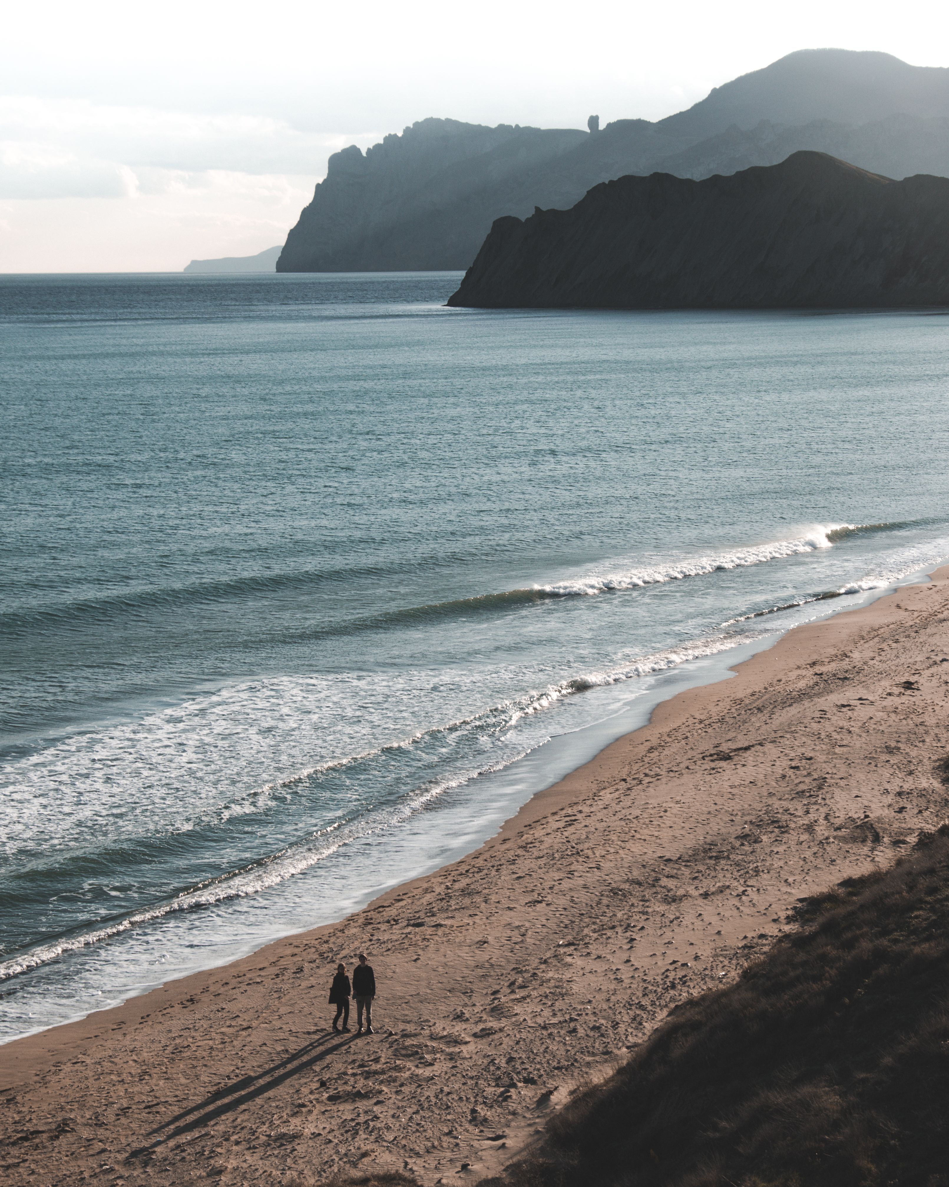 People Walking on Seashore · Free Stock Photo