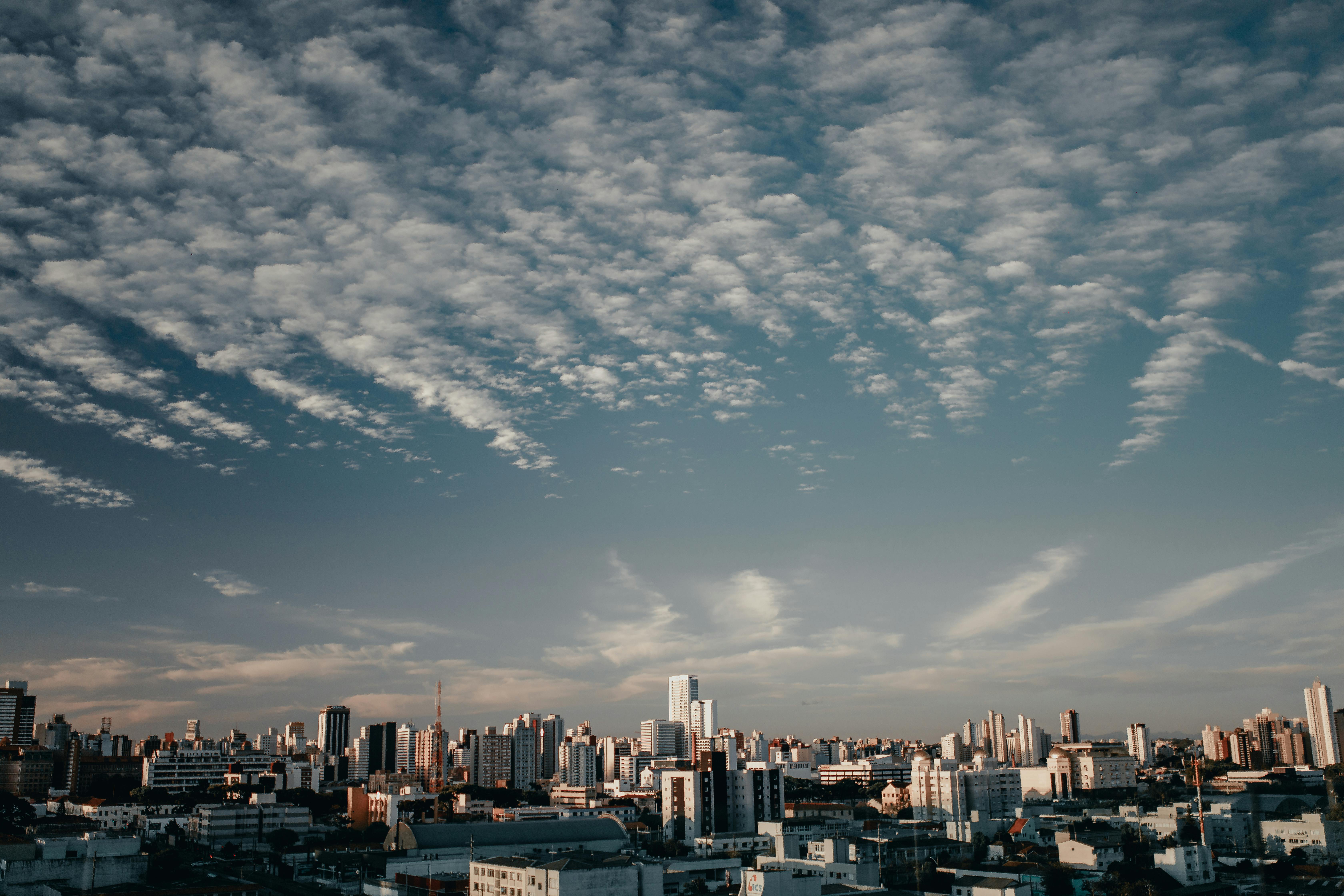 An Aerial Photography of City Buildings Under the Cloudy Sky · Free ...