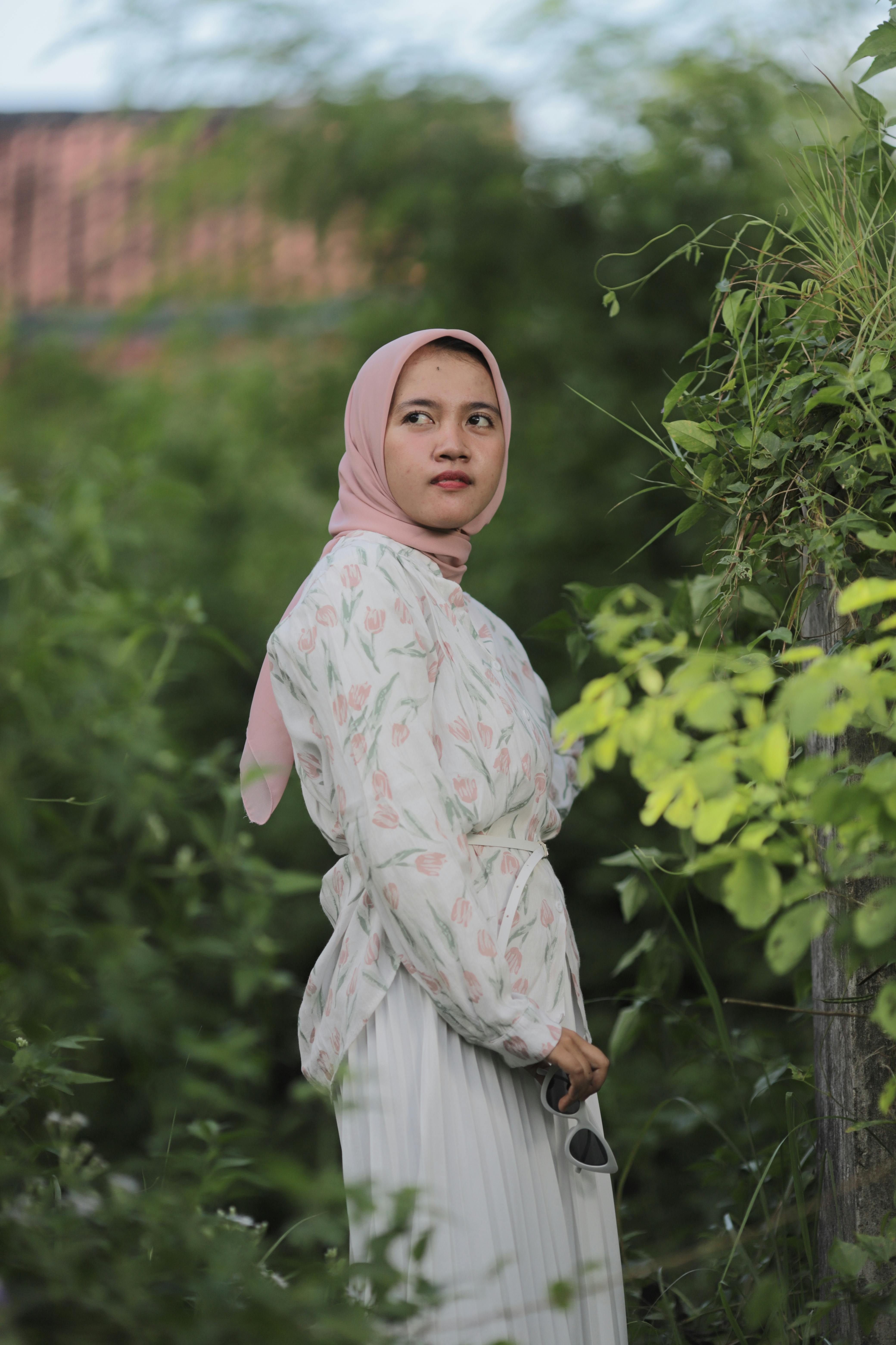 Woman in Black Hijab with Metal Facemask · Free Stock Photo