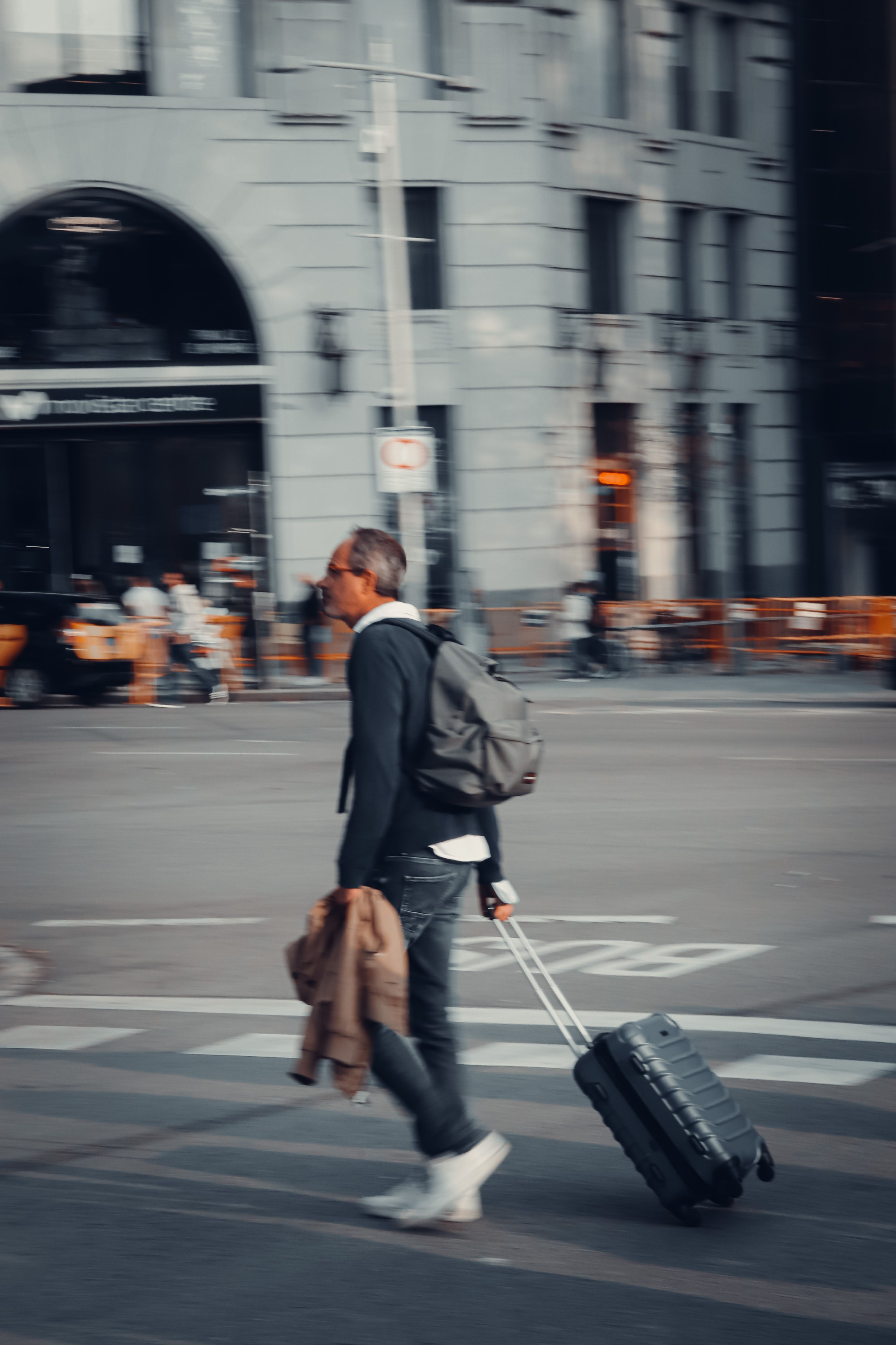 Men with Suitcases on Trolley · Free Stock Photo