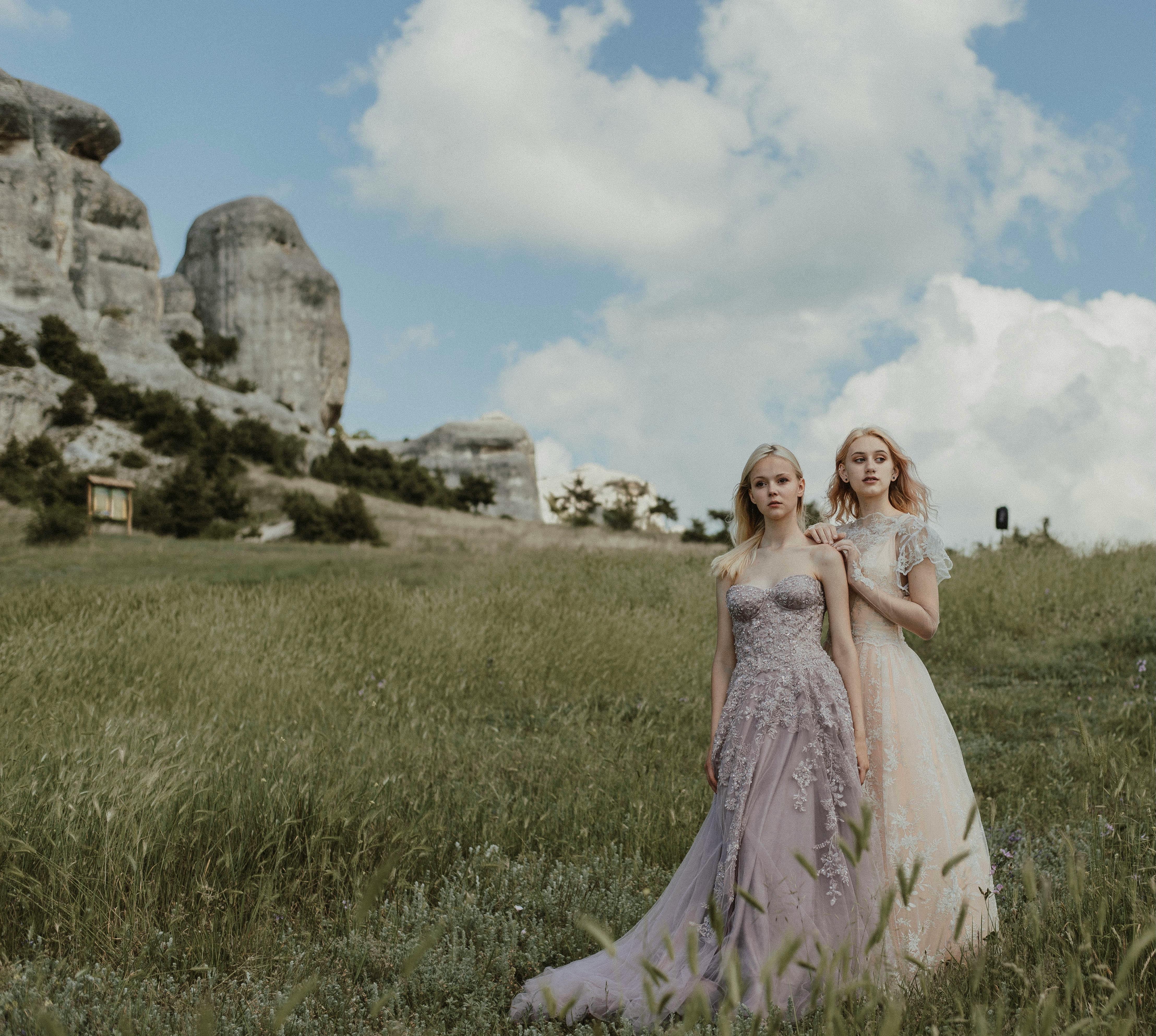Two Women in Elegant Dresses · Free Stock Photo