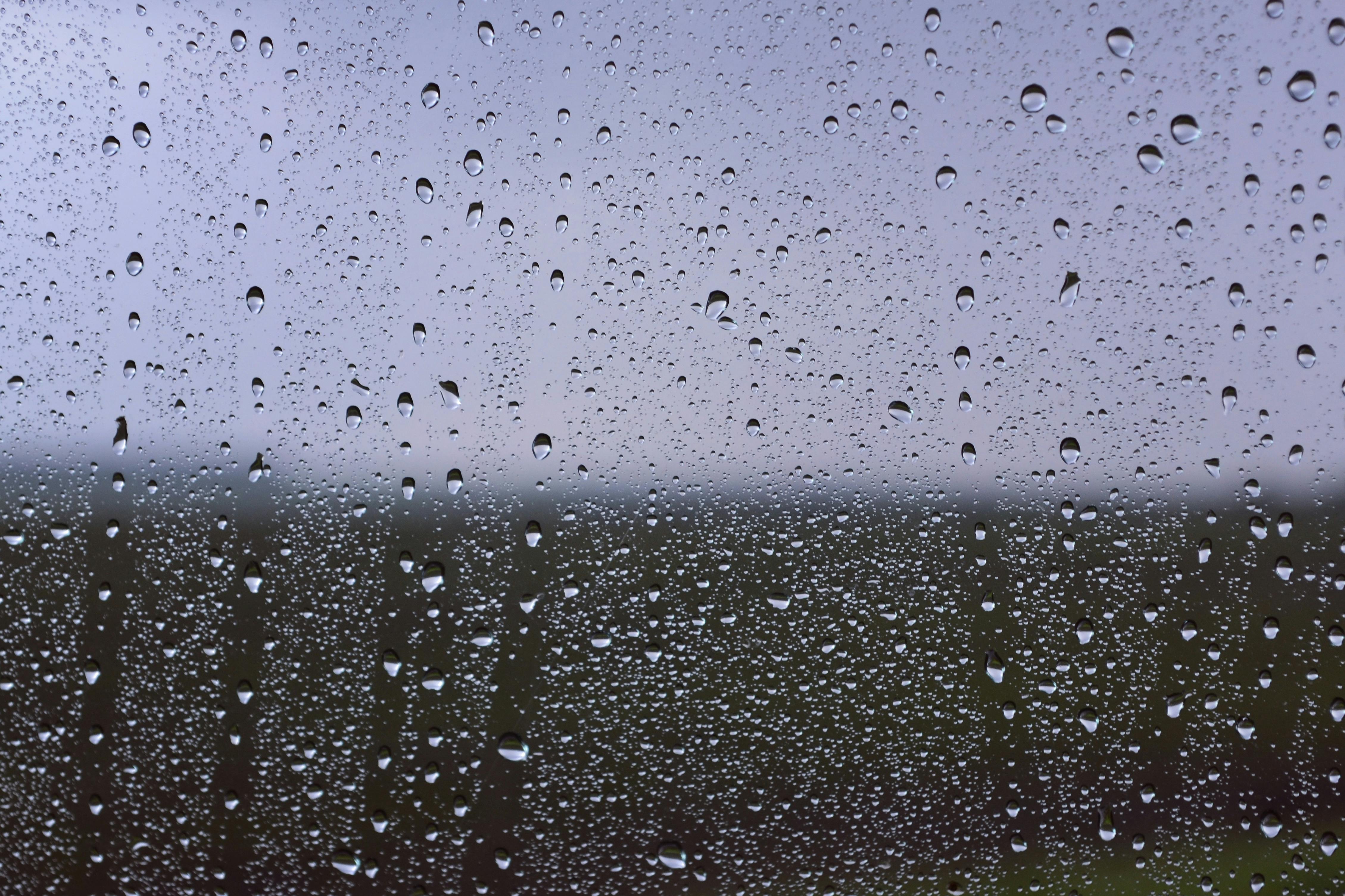 Water Droplets on Glass Window · Free Stock Photo