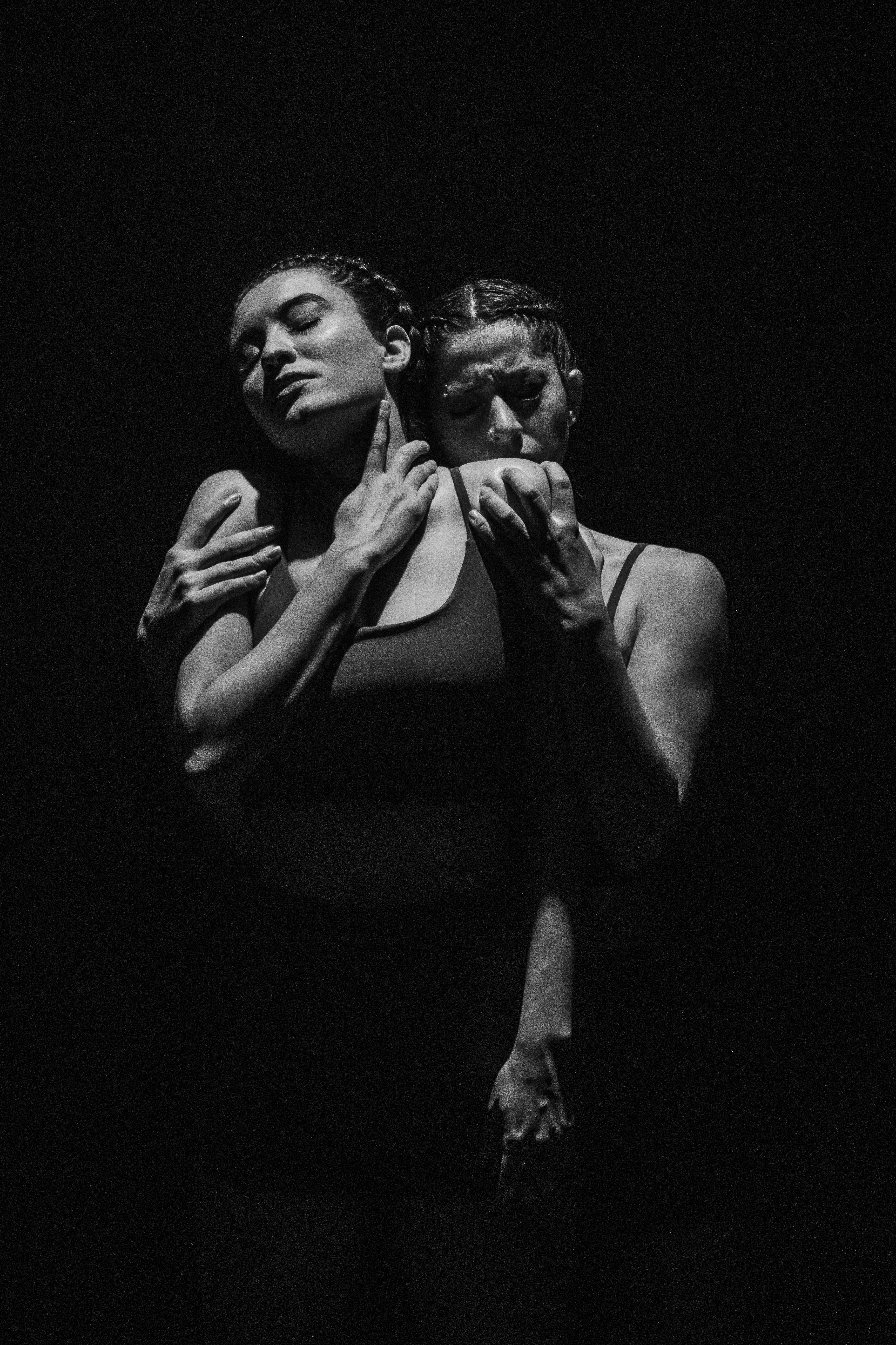 Women in Tank Top in a Hugging Position · Free Stock Photo