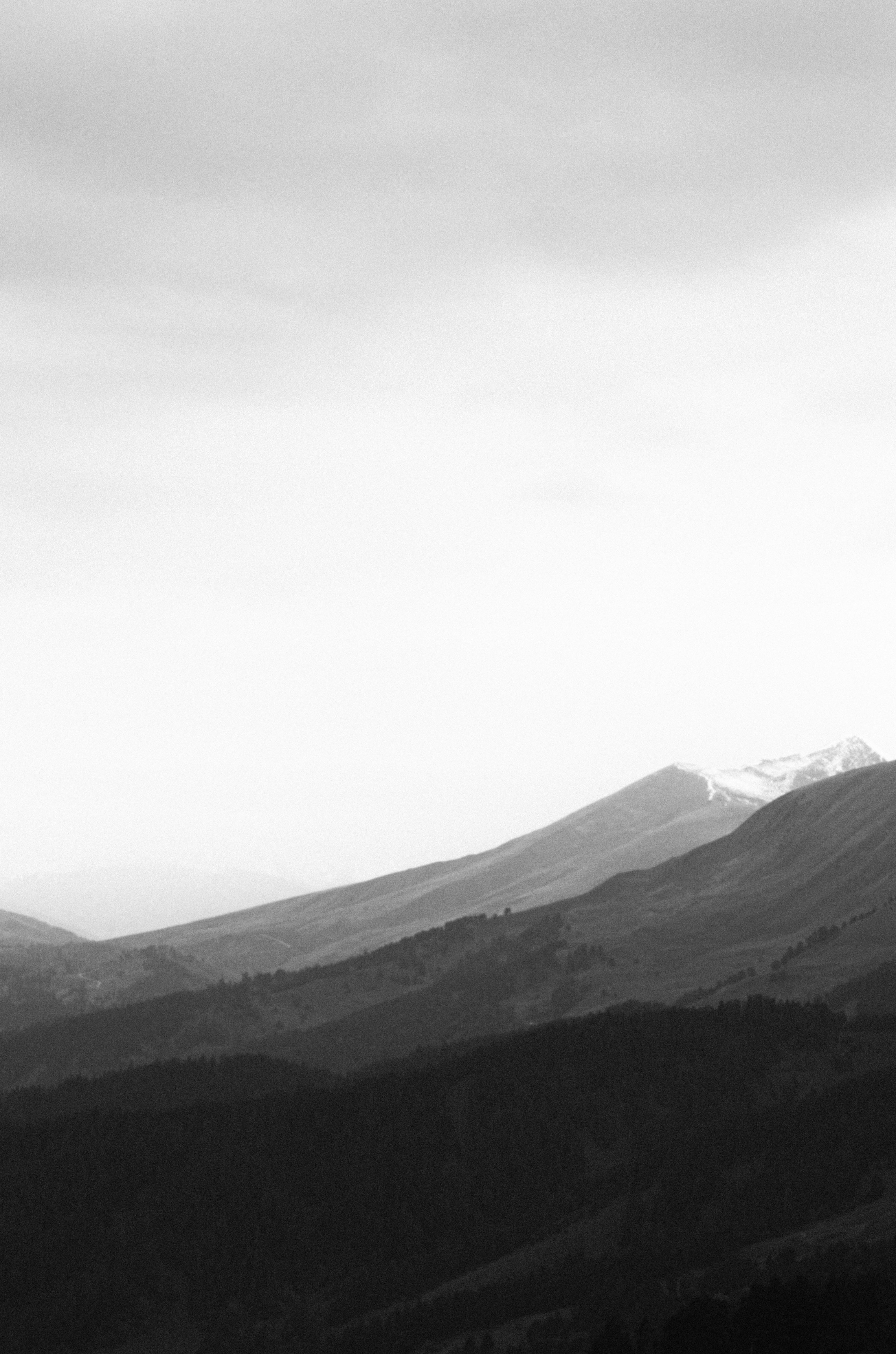 A Grayscale of a Mountain Range · Free Stock Photo