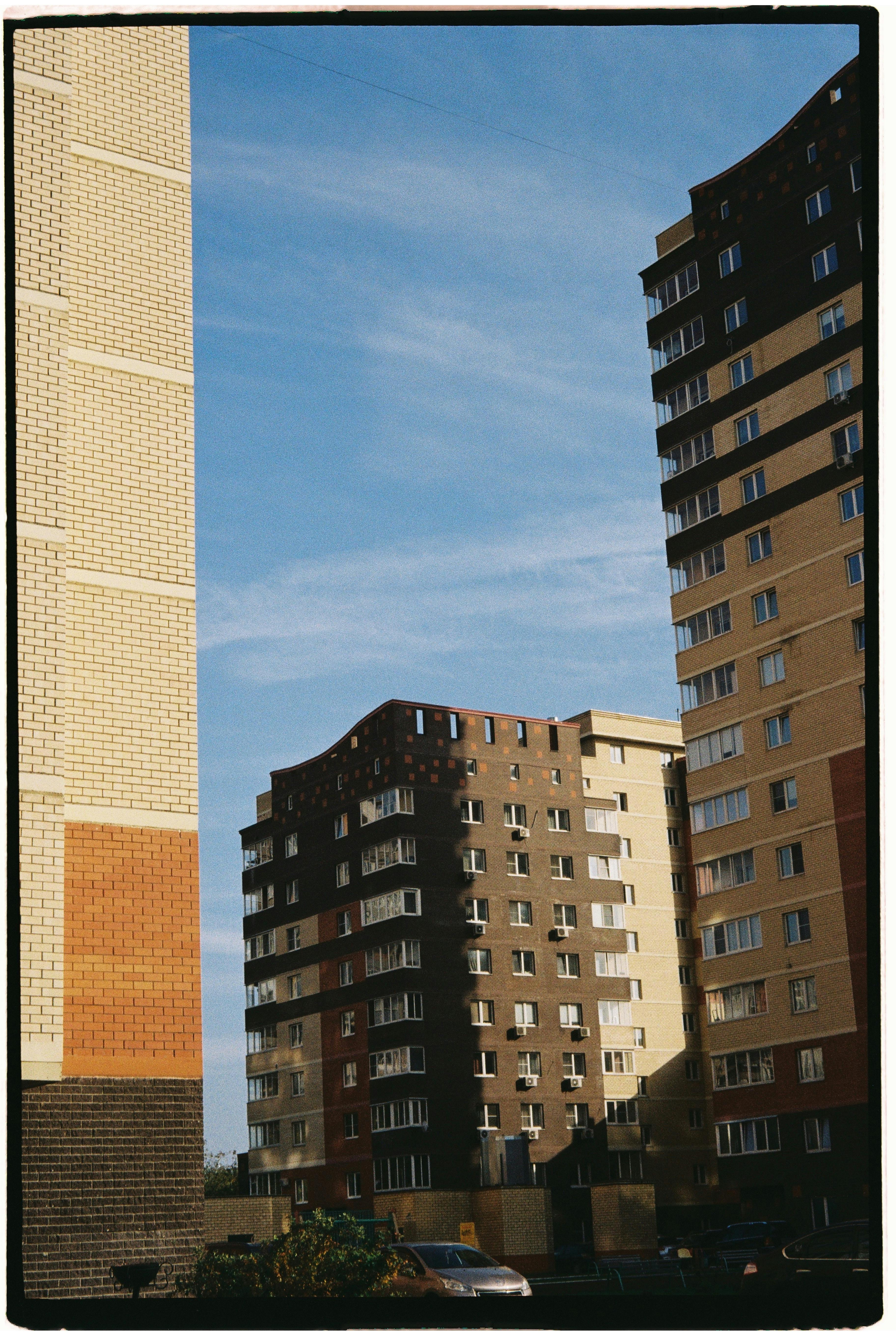 Brown and Beige Residential Buildings · Free Stock Photo