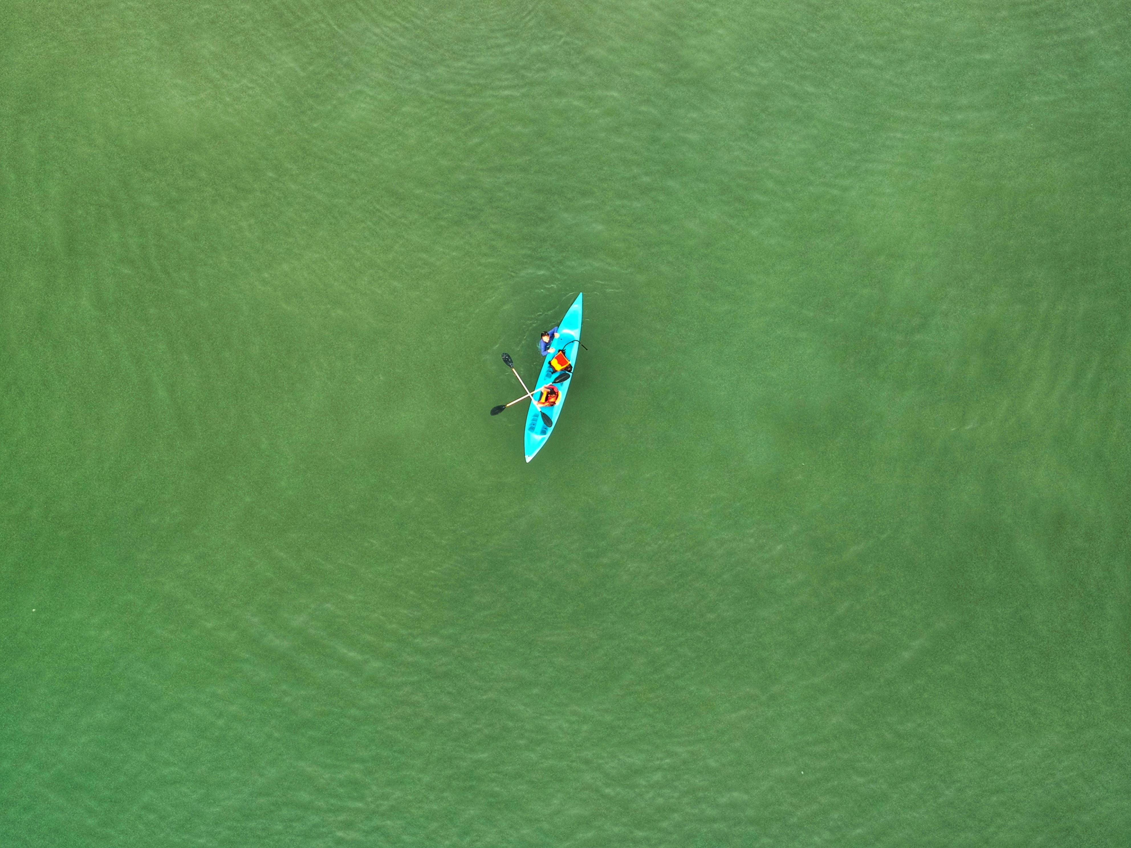 Man Kayaking at a River · Free Stock Photo