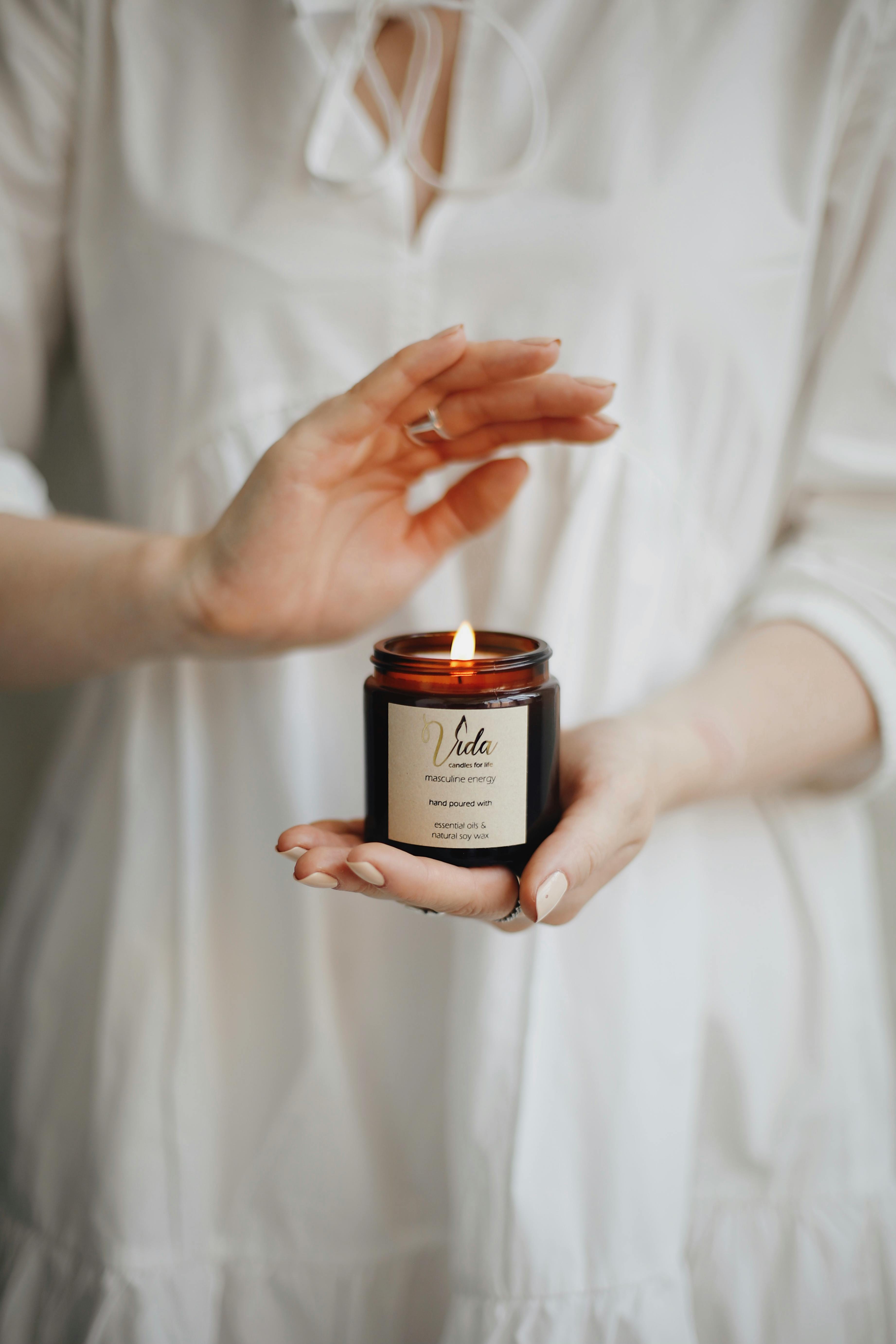 Woman in White Dress Holding Candle · Free Stock Photo
