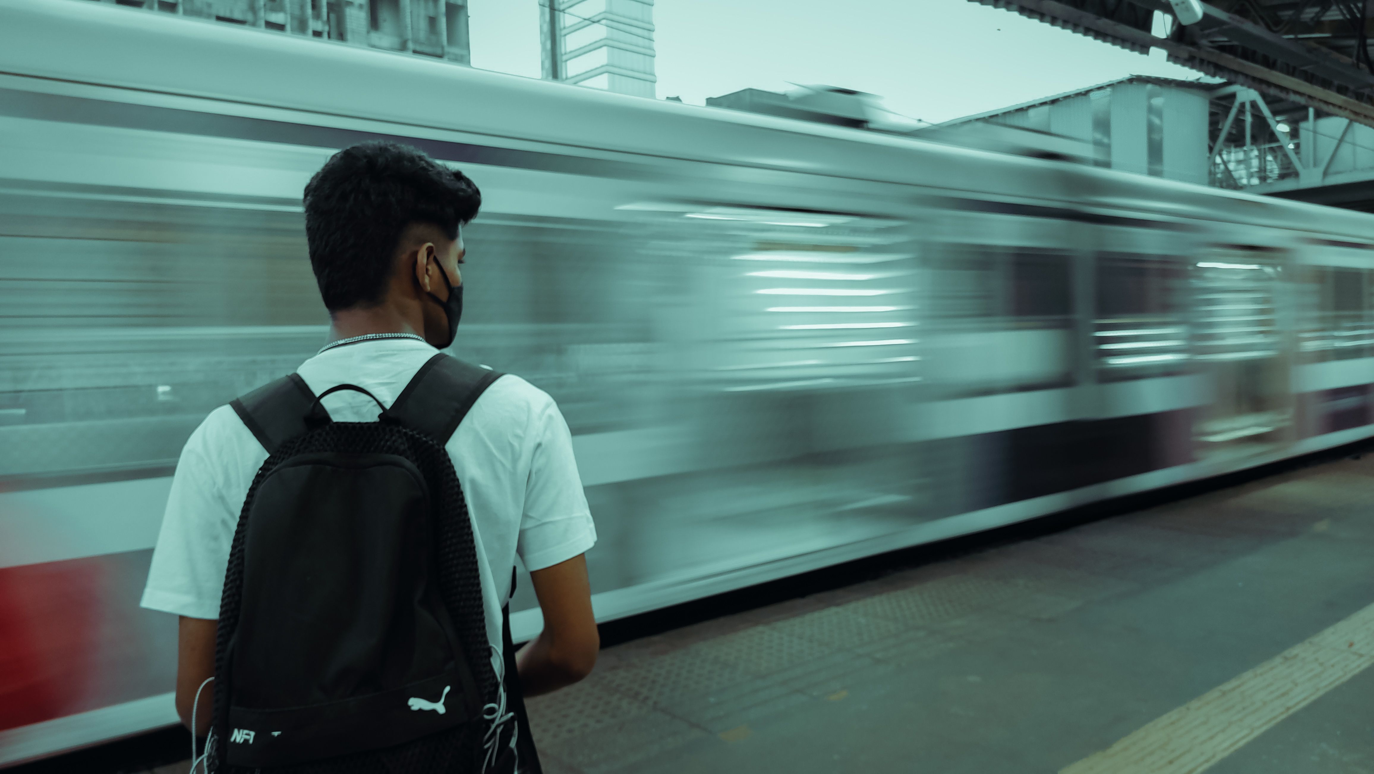 Man Standing in Train Station · Free Stock Photo