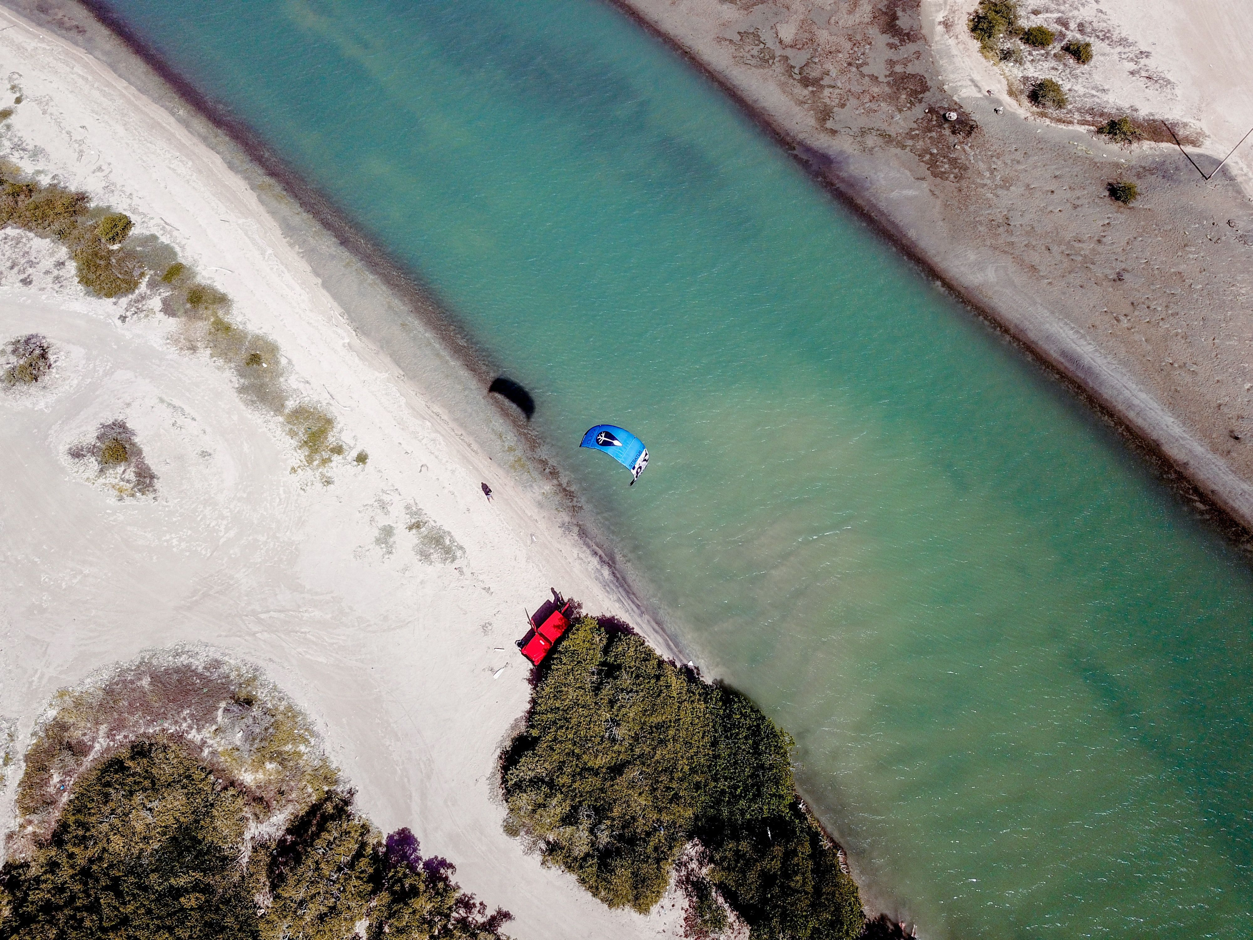 Birds Eye View of a Tourist Resort on the Riverbank · Free Stock Photo