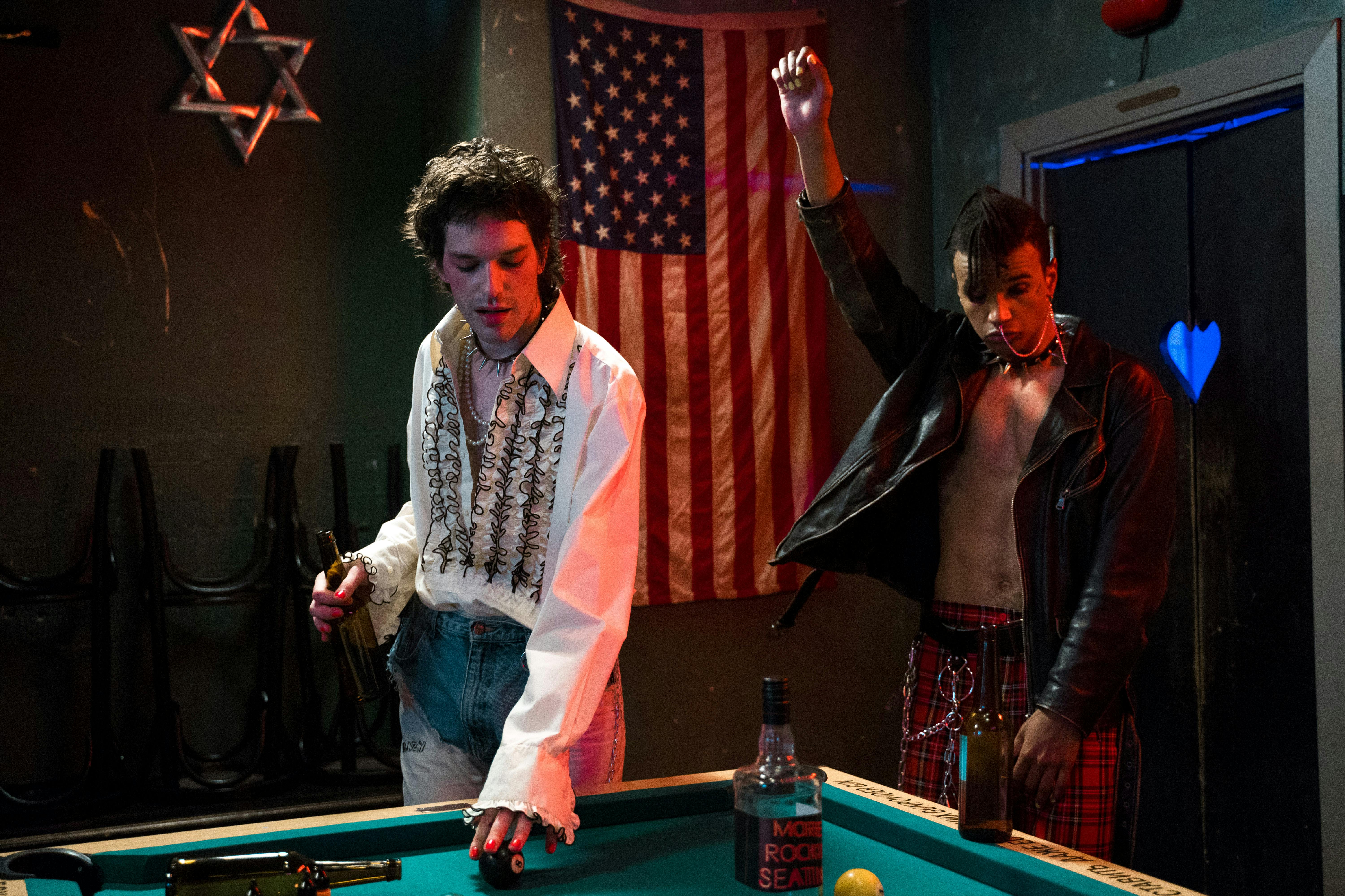 Two Men Drinking Alcohol and Playing Billiards · Free Stock Photo