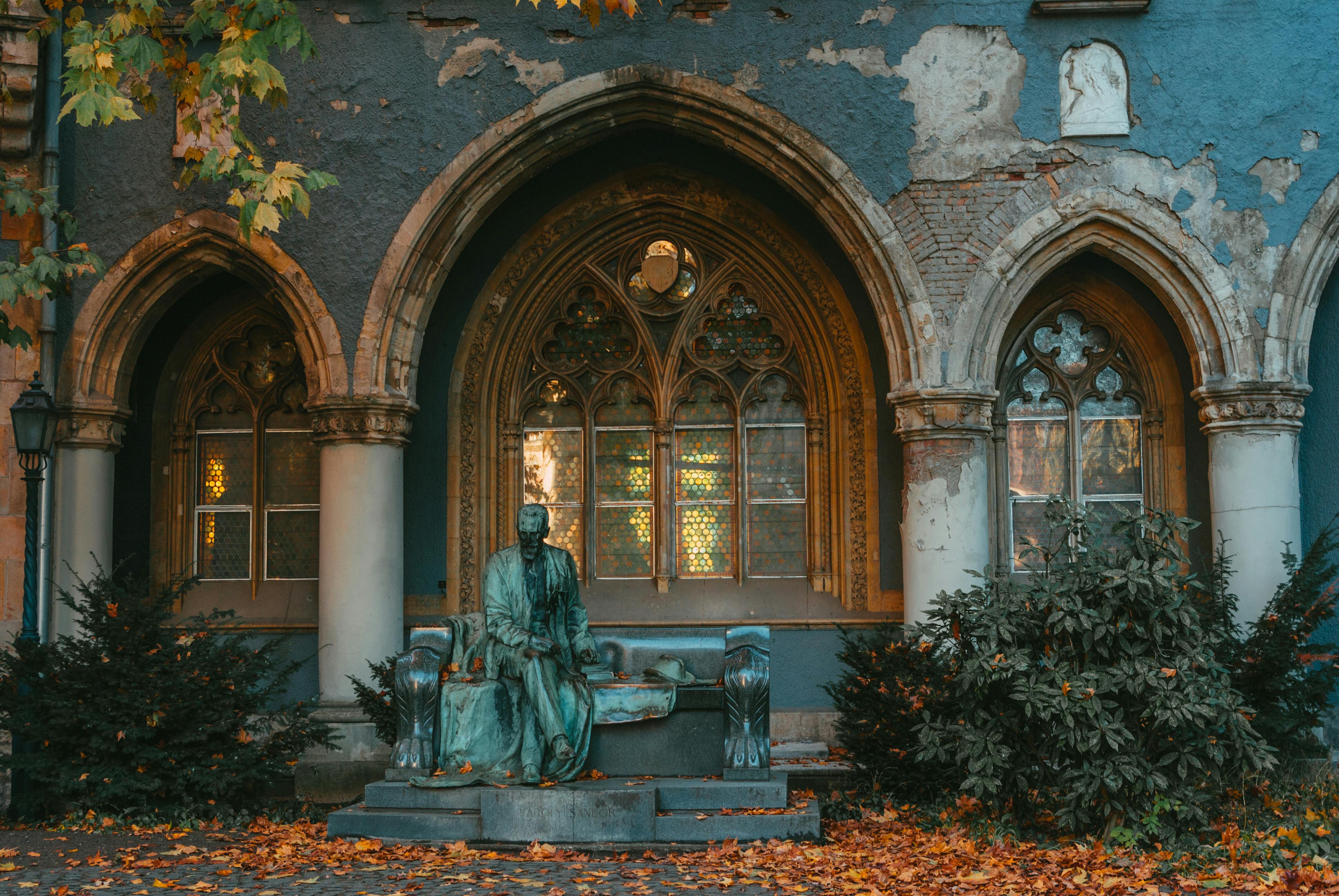 Sculpture and Arches of Building · Free Stock Photo