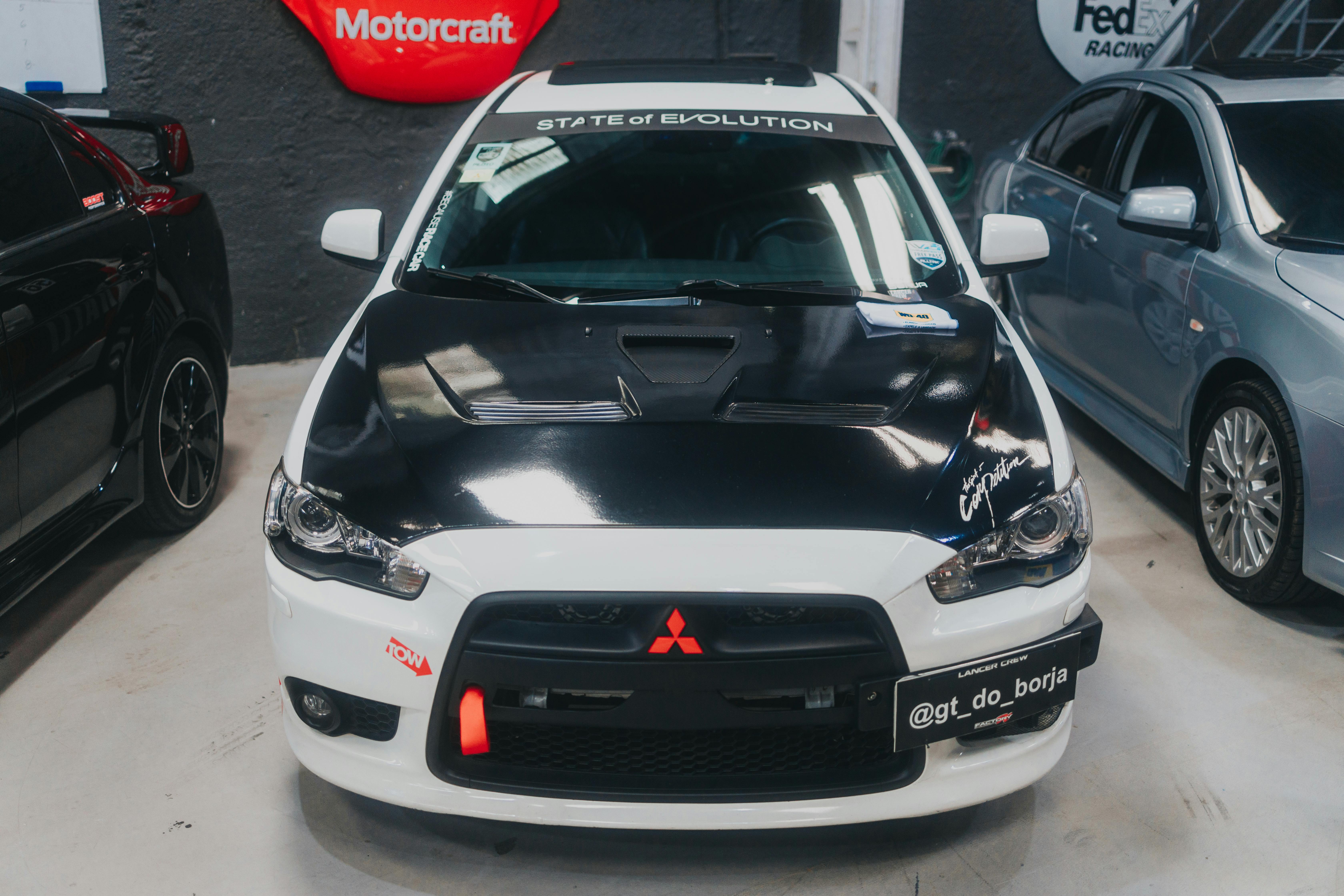 Black and White Mitsubishi Lancer · Free Stock Photo