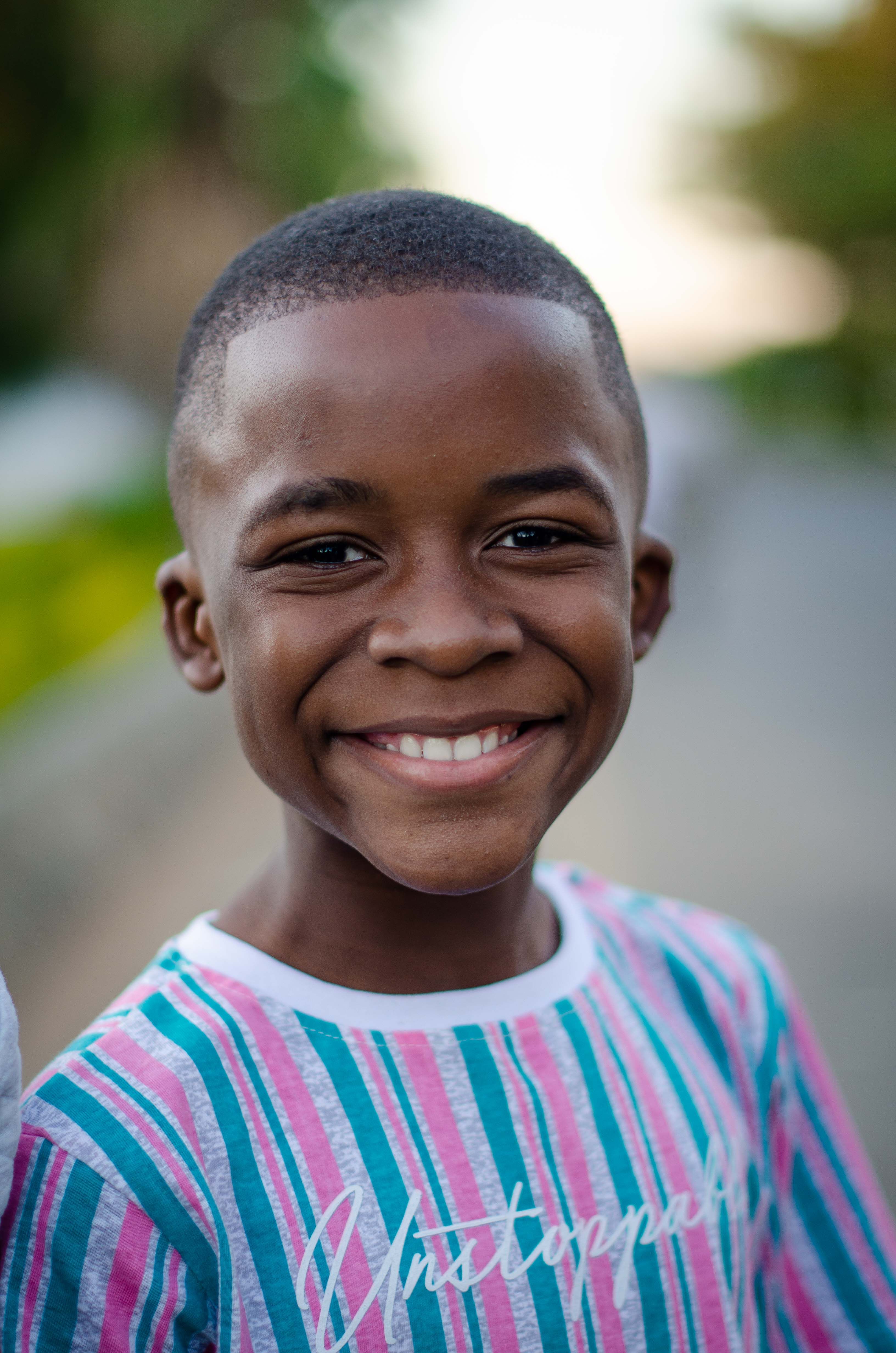 Close-Up Shot of a Boy Smiling · Free Stock Photo