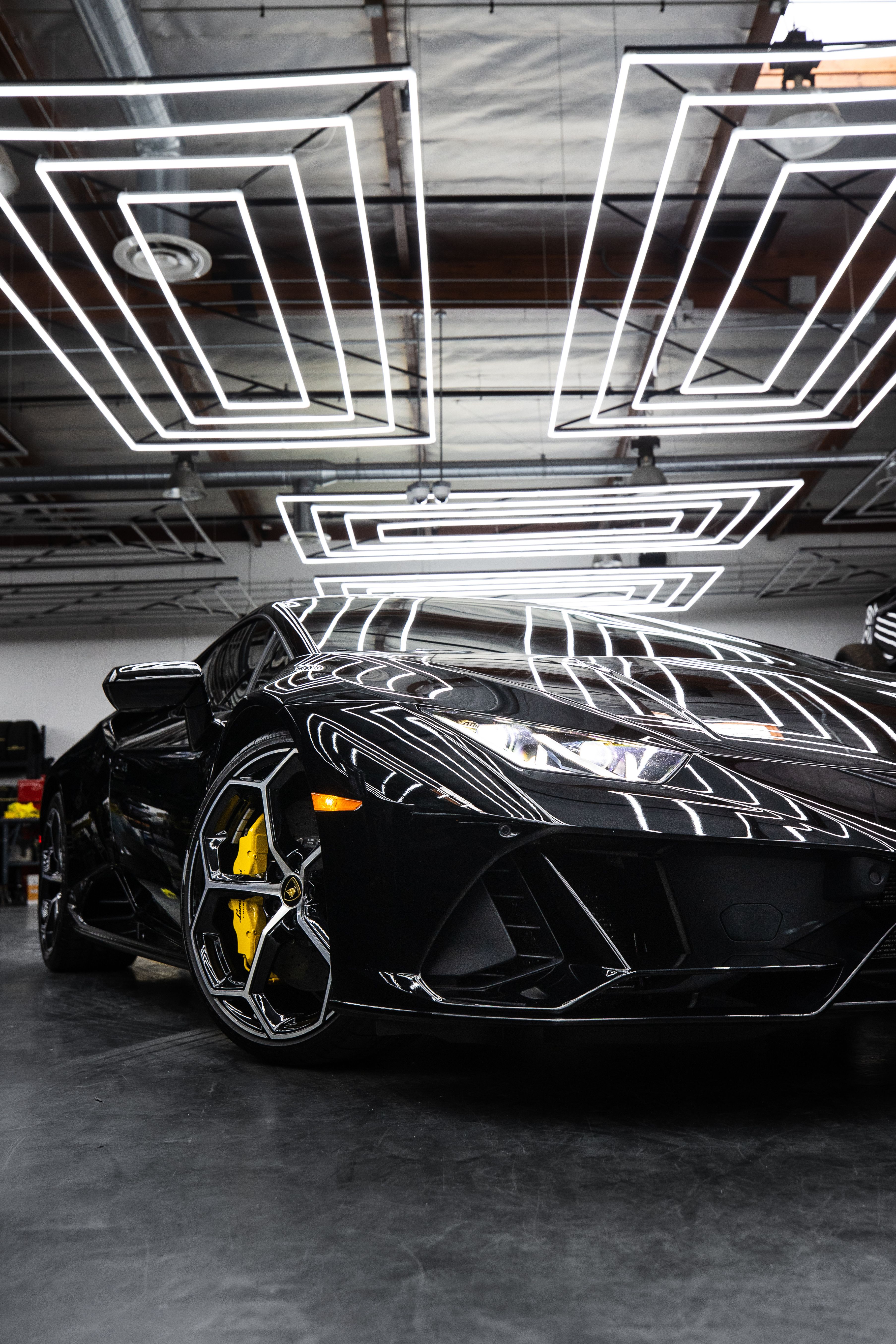 Black Luxury Car in Showroom · Free Stock Photo