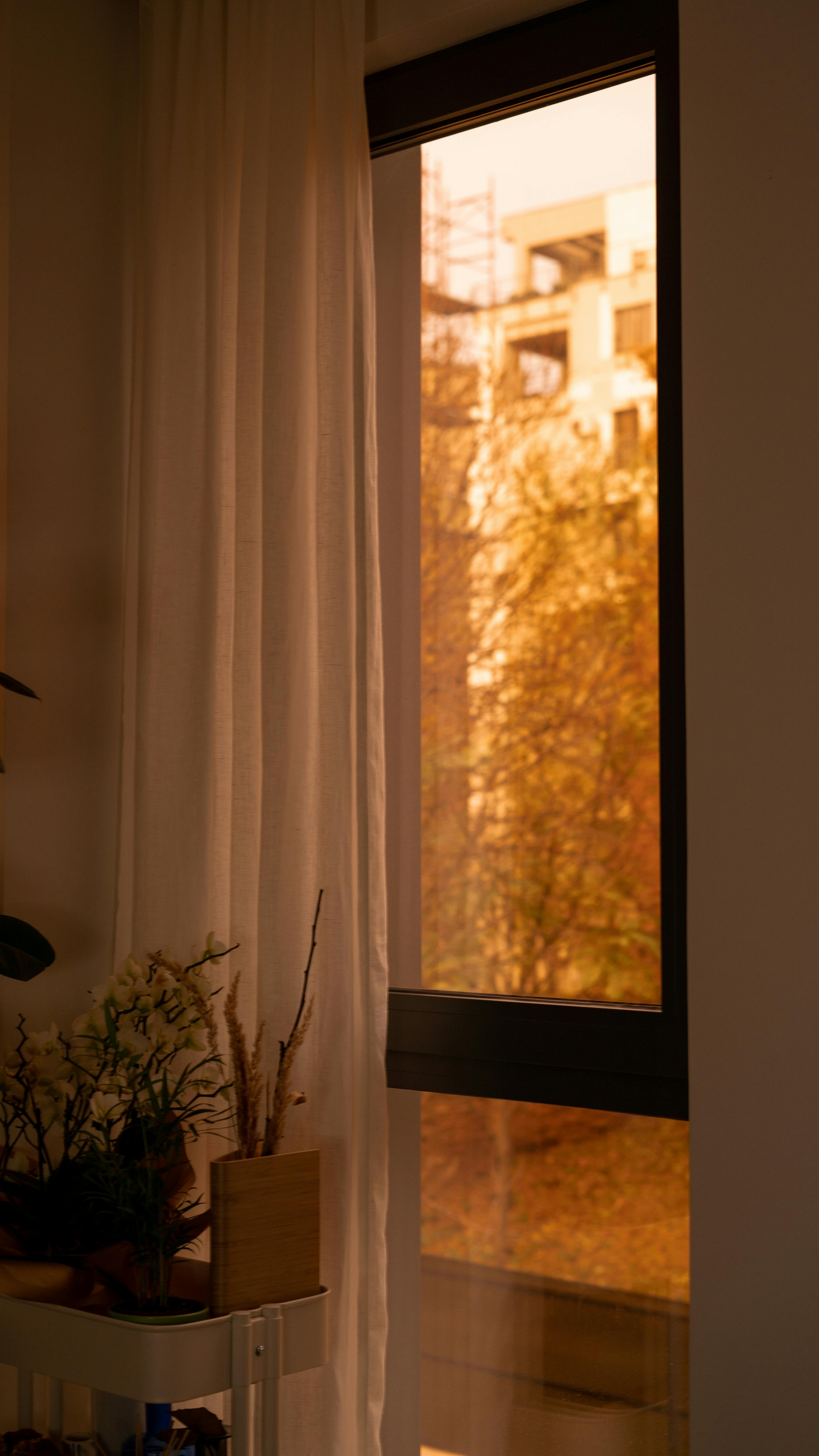 A Glass Window with a Curtain · Free Stock Photo
