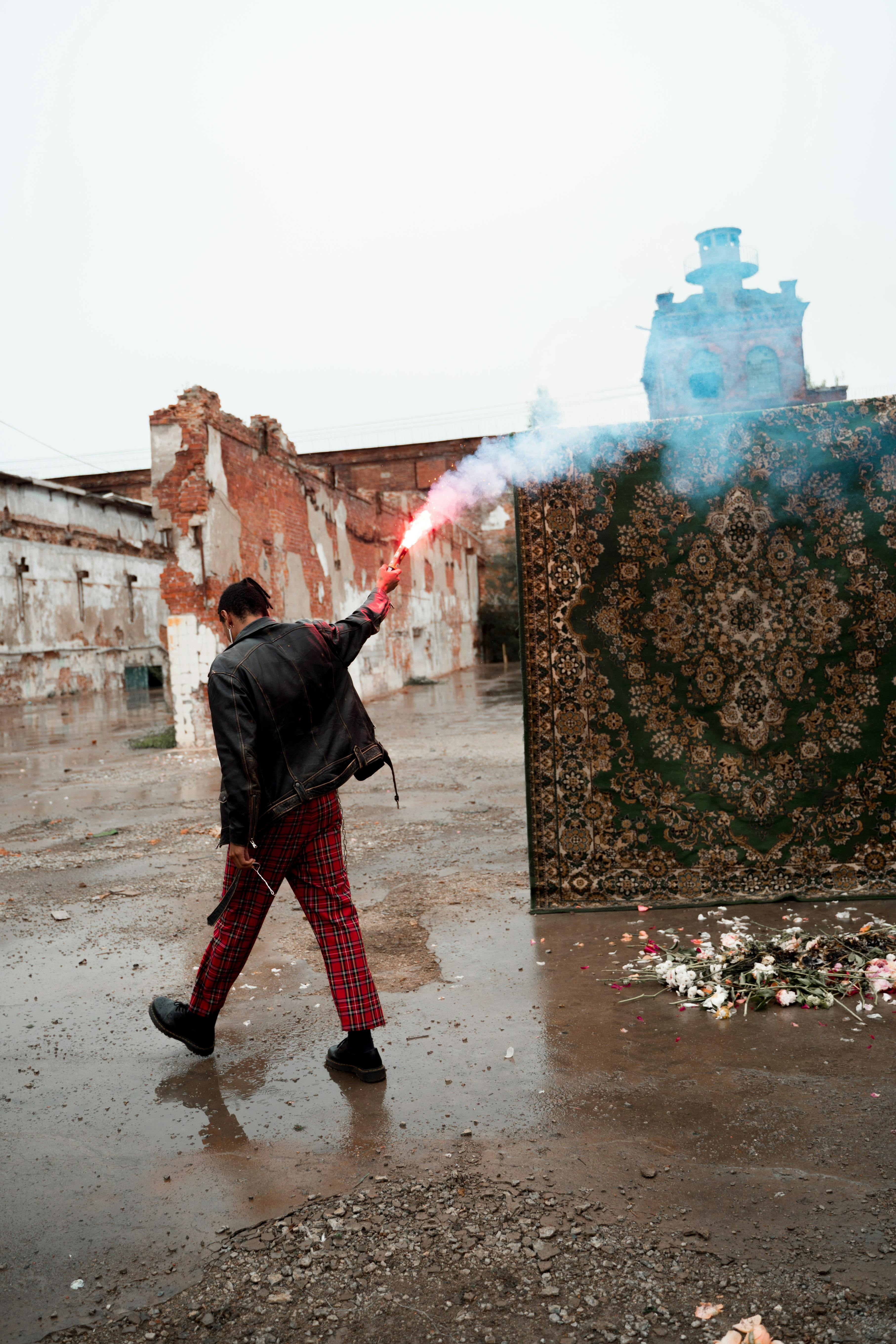 Man with Flare on City Stree · Free Stock Photo