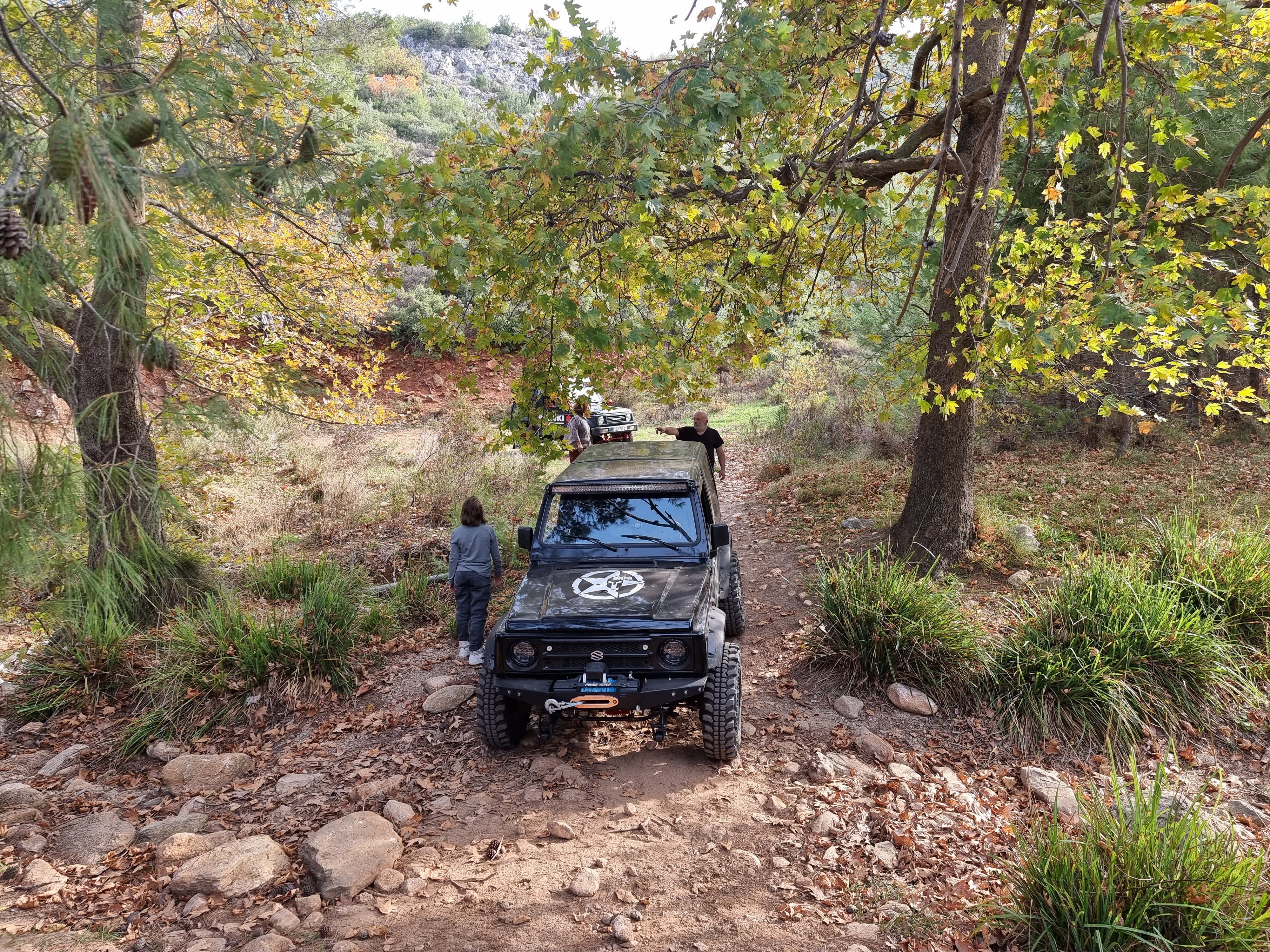 People with Jeep in Forest · Free Stock Photo