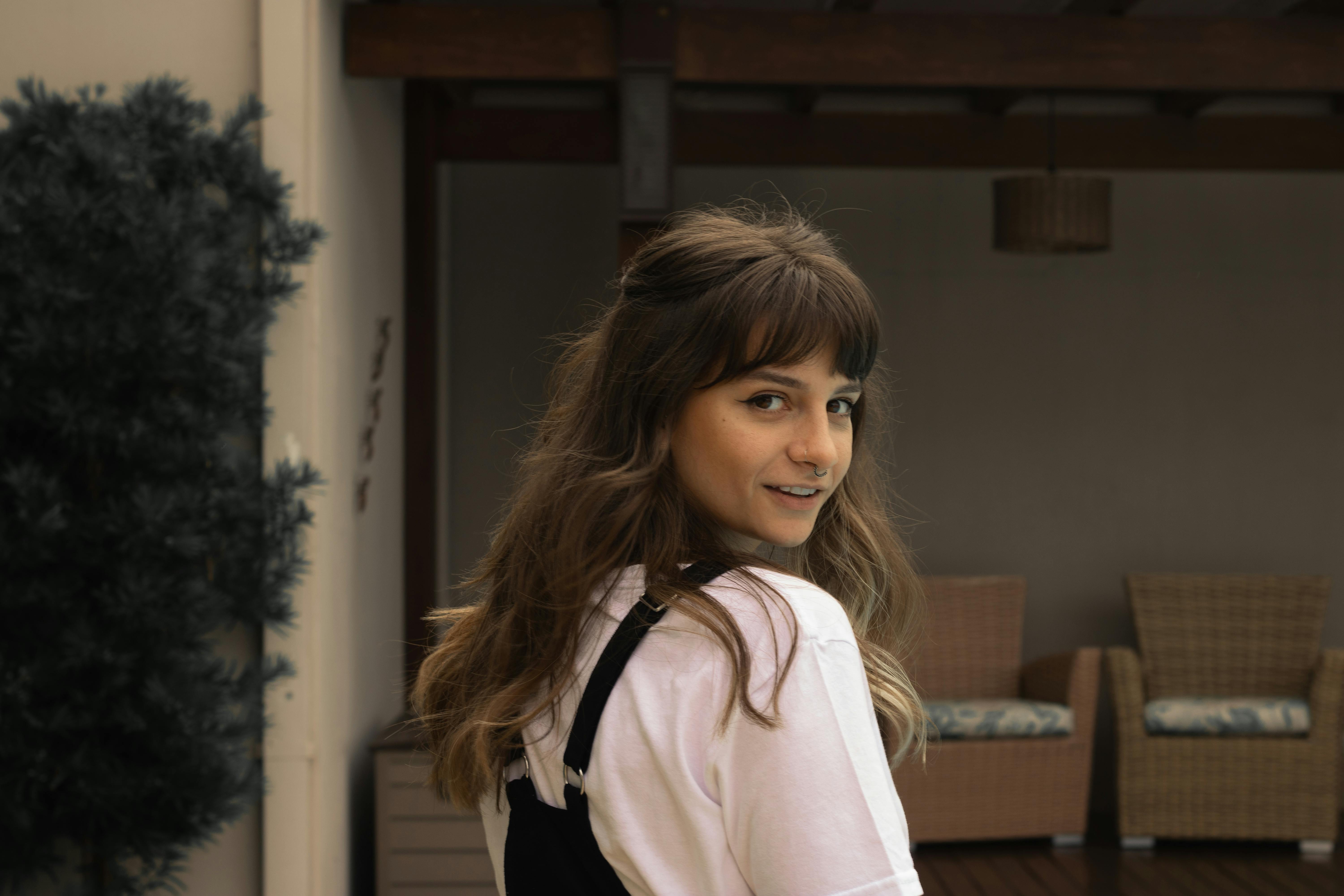 Beautiful Woman Looking Back · Free Stock Photo