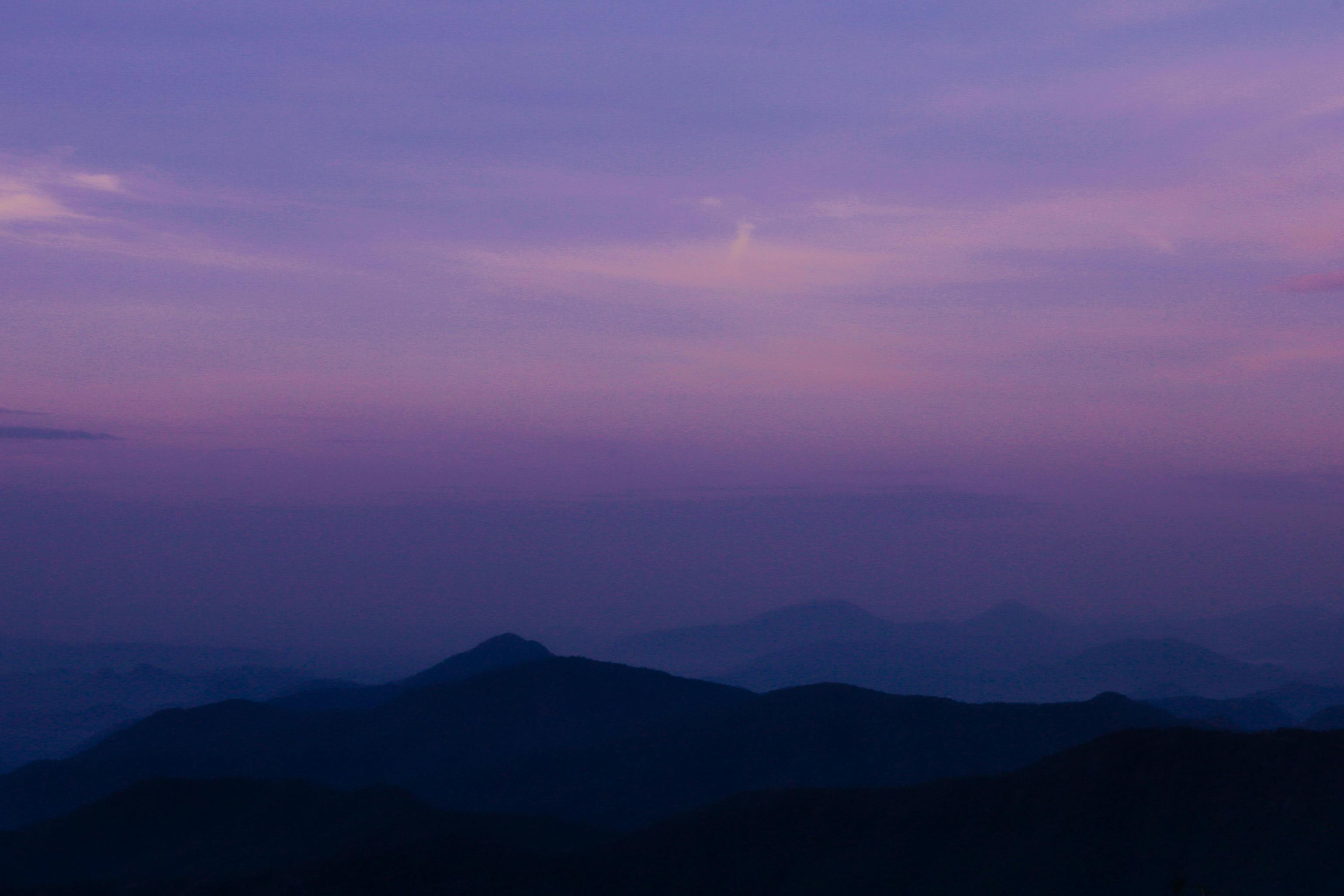 Mountain Ranges Under Purple Sky · Free Stock Photo