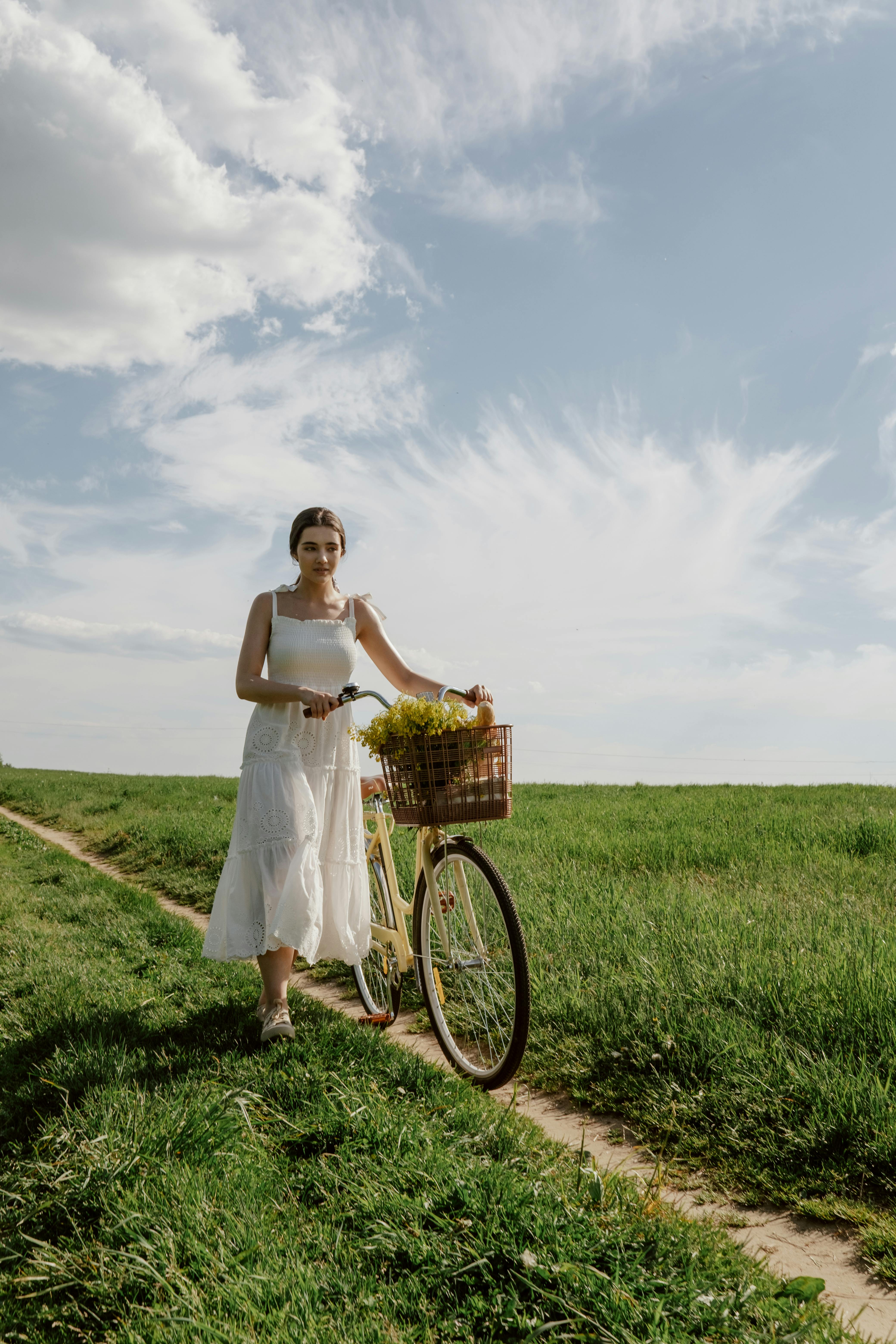 Woman with Bicycle on Footpath · Free Stock Photo