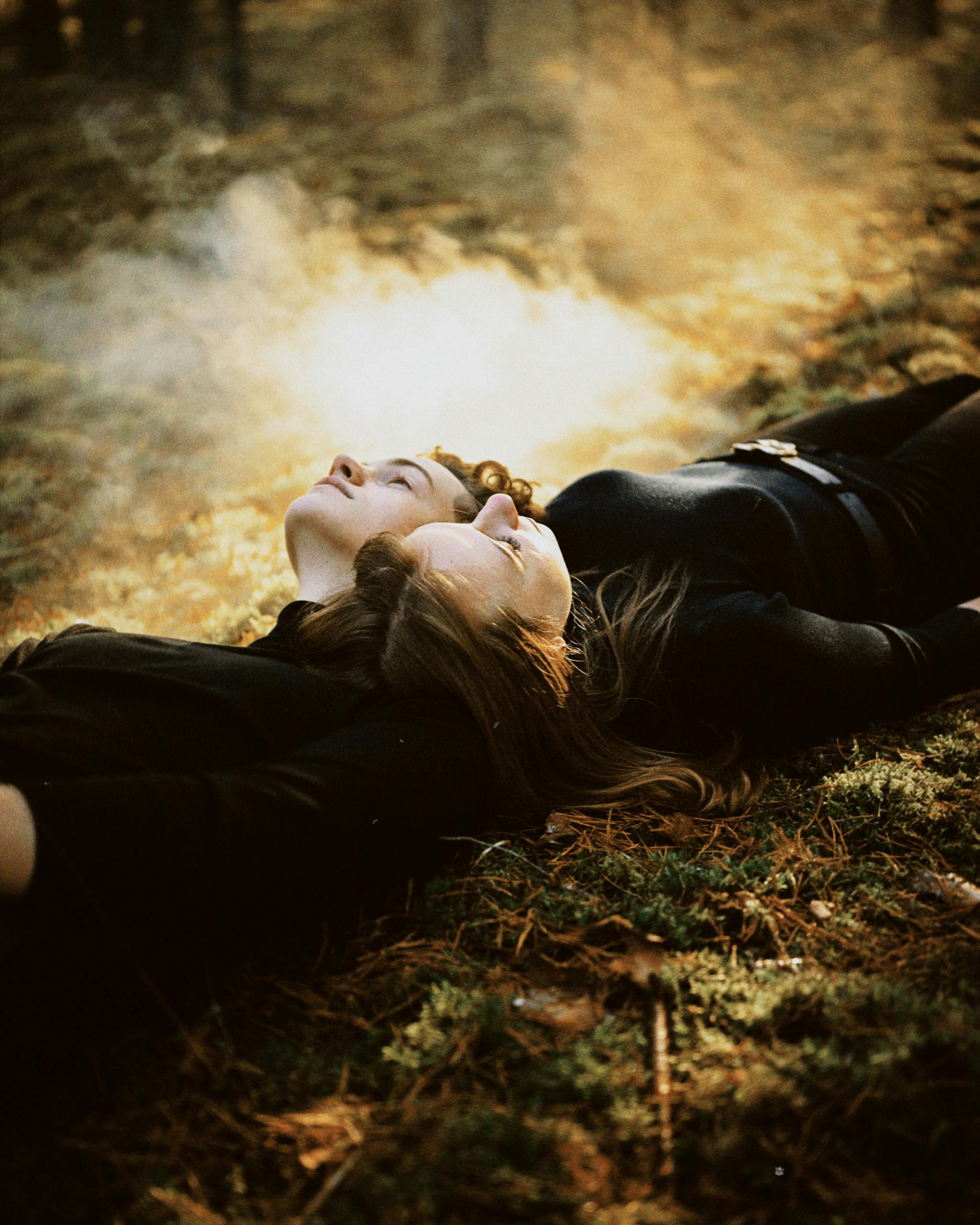 Woman Laying Down On Ground · Free Stock Photo