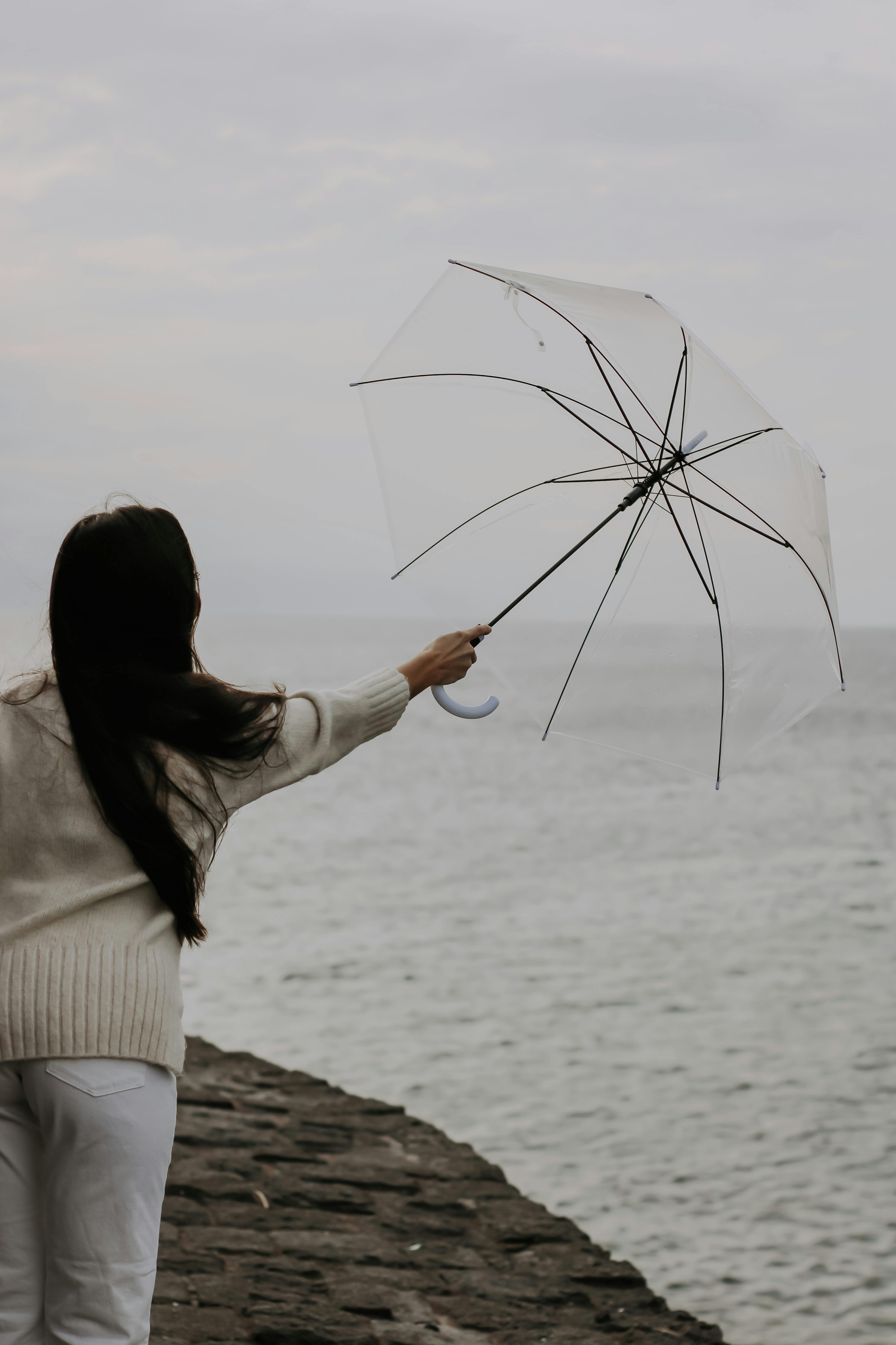 Woman Walking with Umbrella · Free Stock Photo