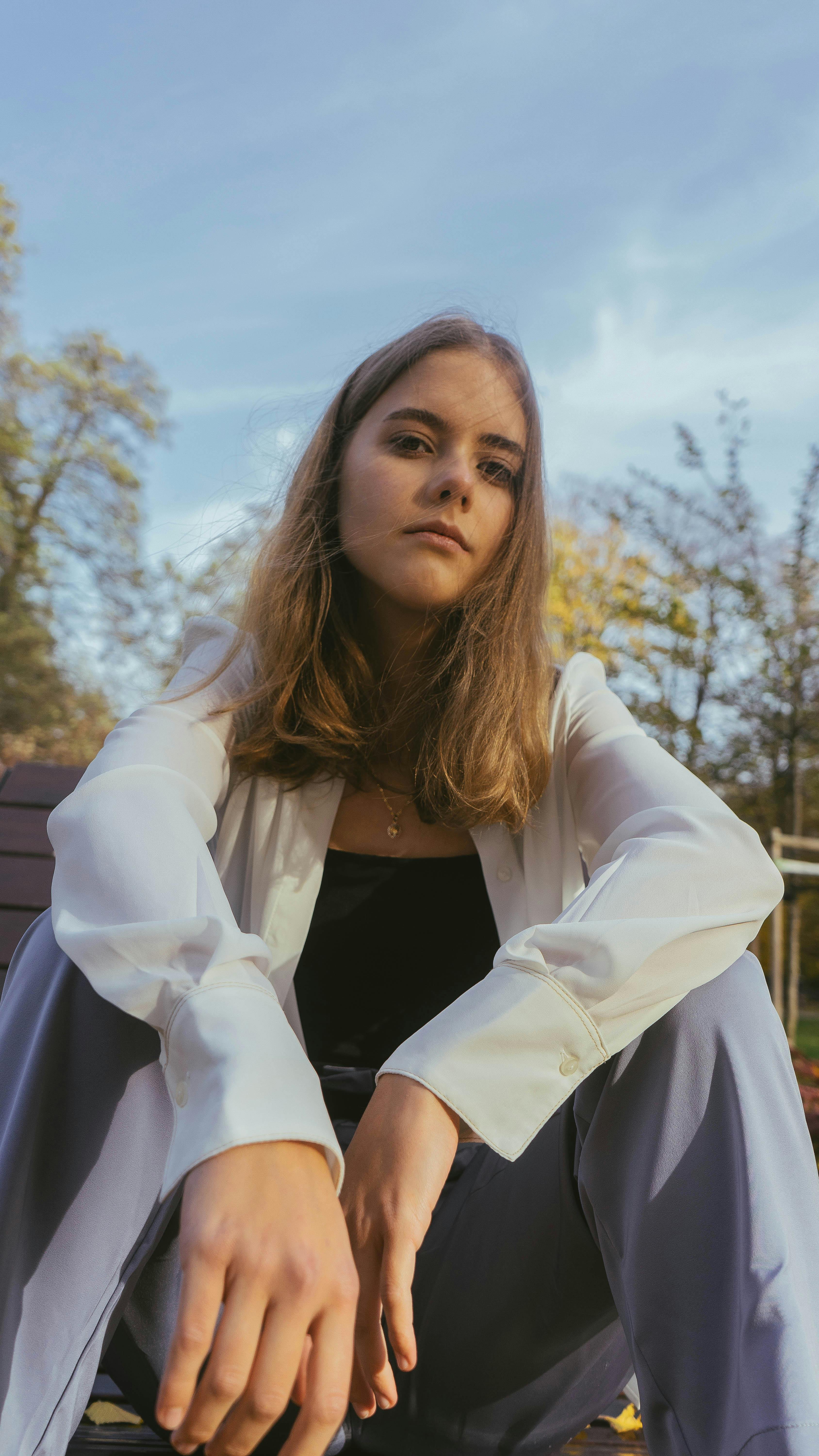 Brunette Woman Dancing with Messy Hair · Free Stock Photo